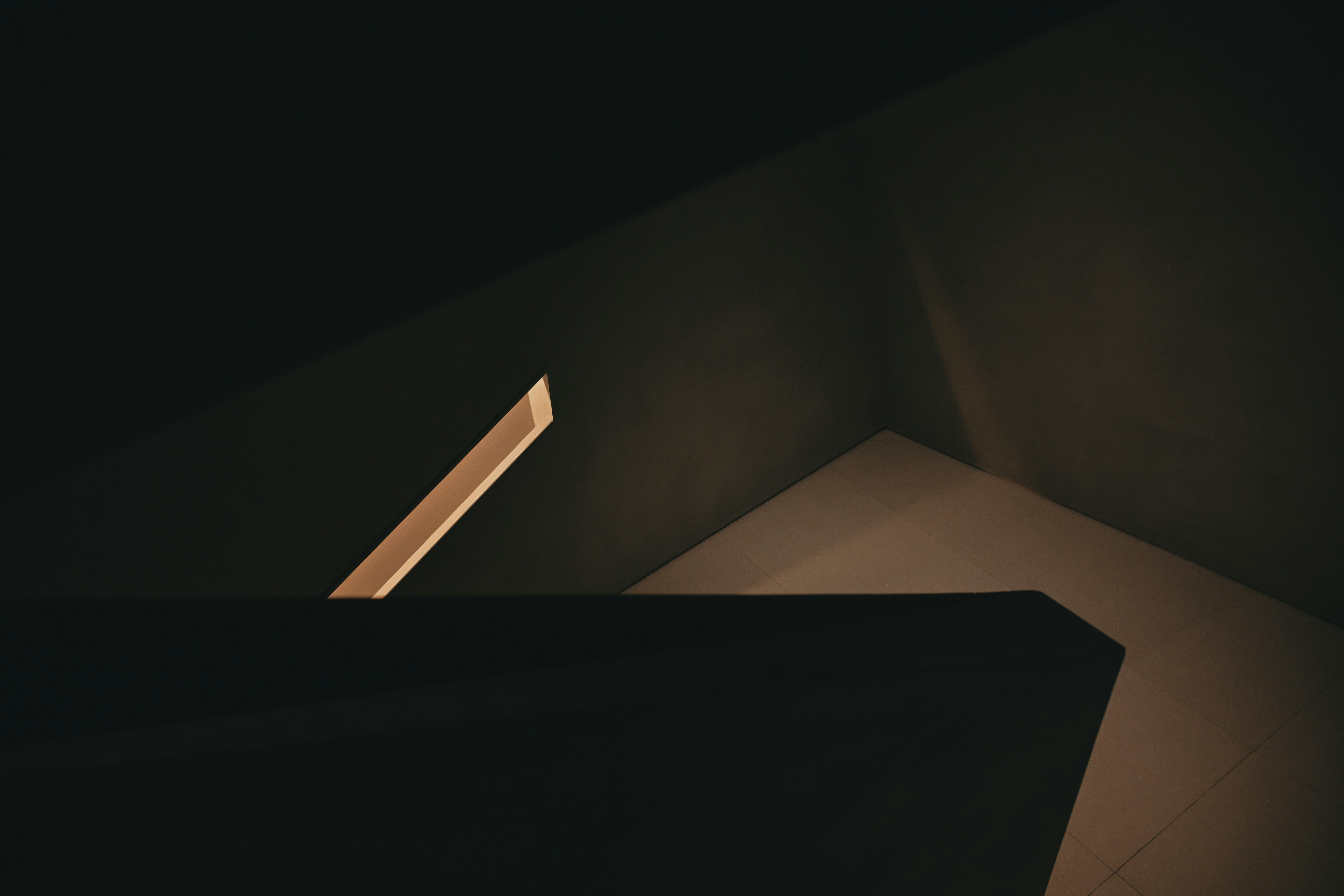 Muted Geometry: A Dim Stairwell’s Quiet Edge