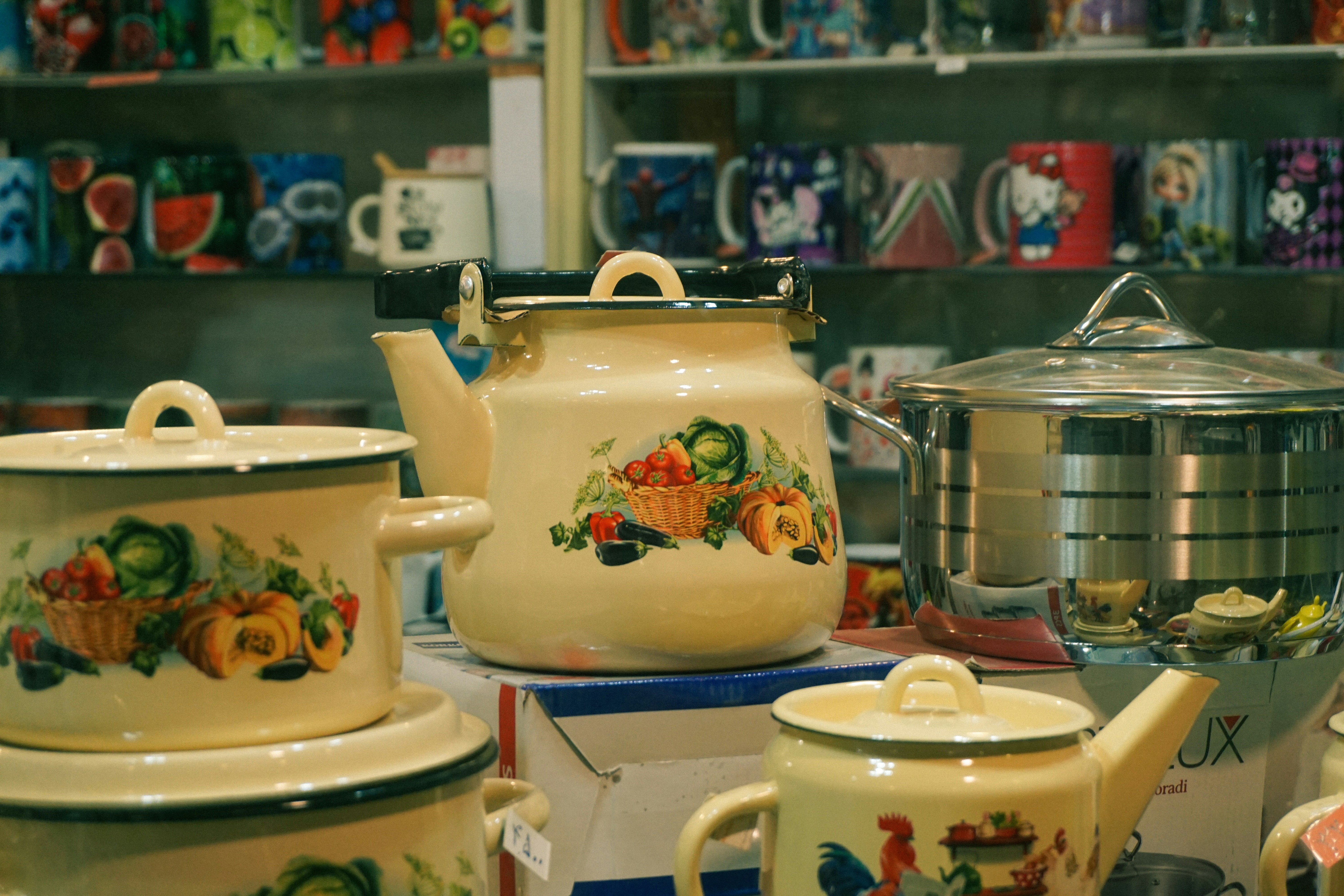 Ceramic Teapot Parade on a Shop Shelf