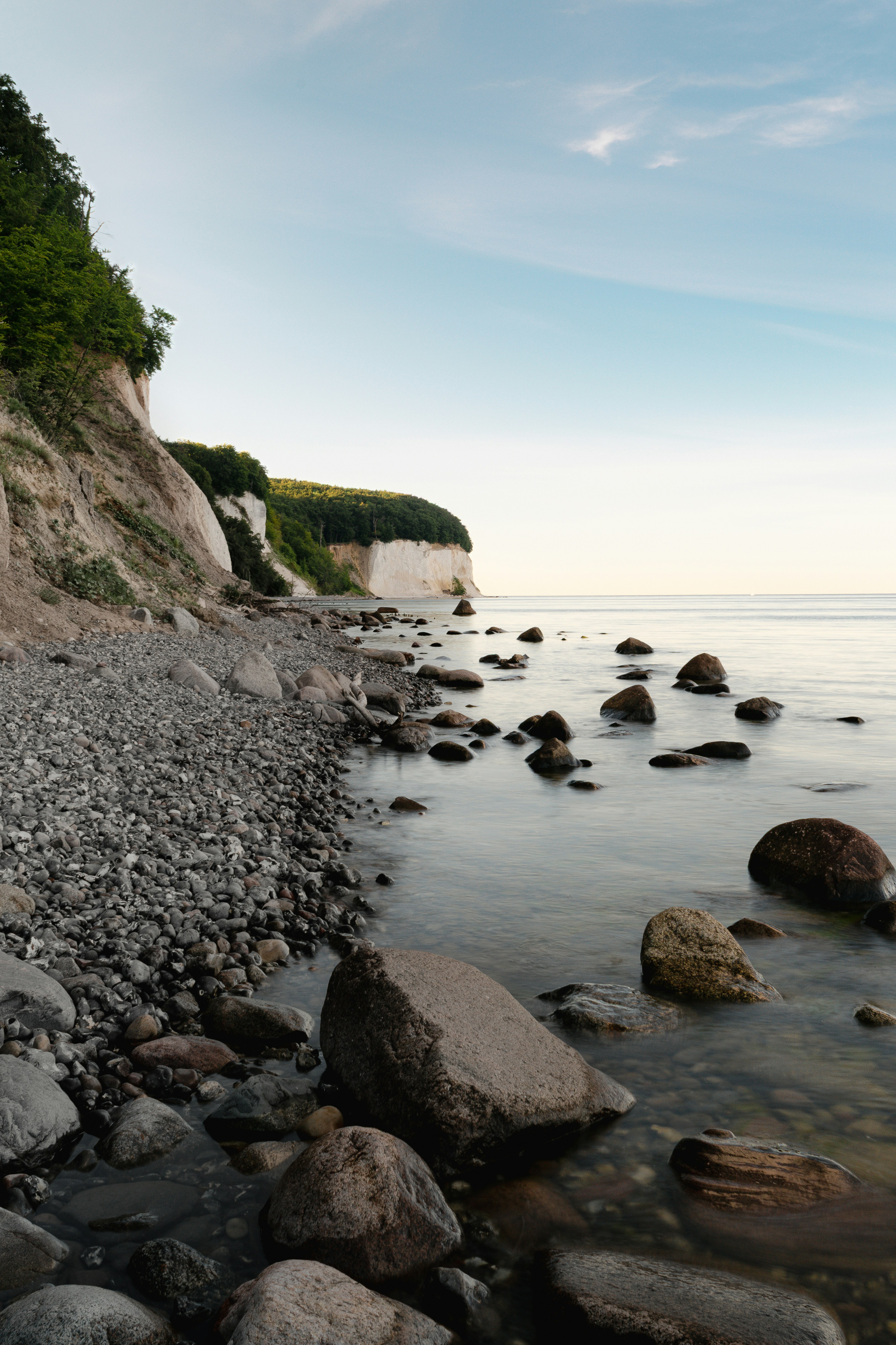 Cliffside Pebble Shore at Dusk