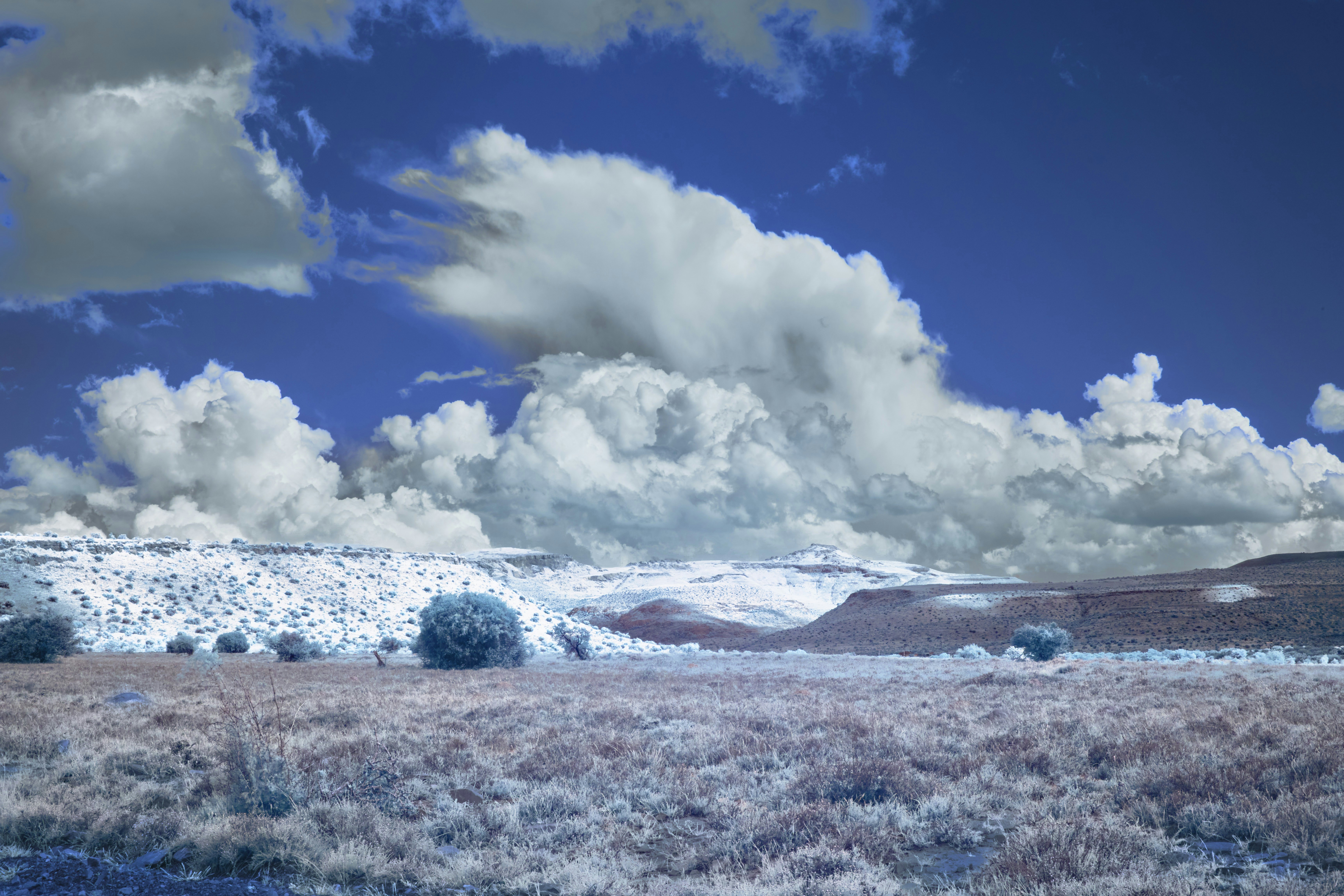 Desert Horizon Under a Layered Cumulus Sky