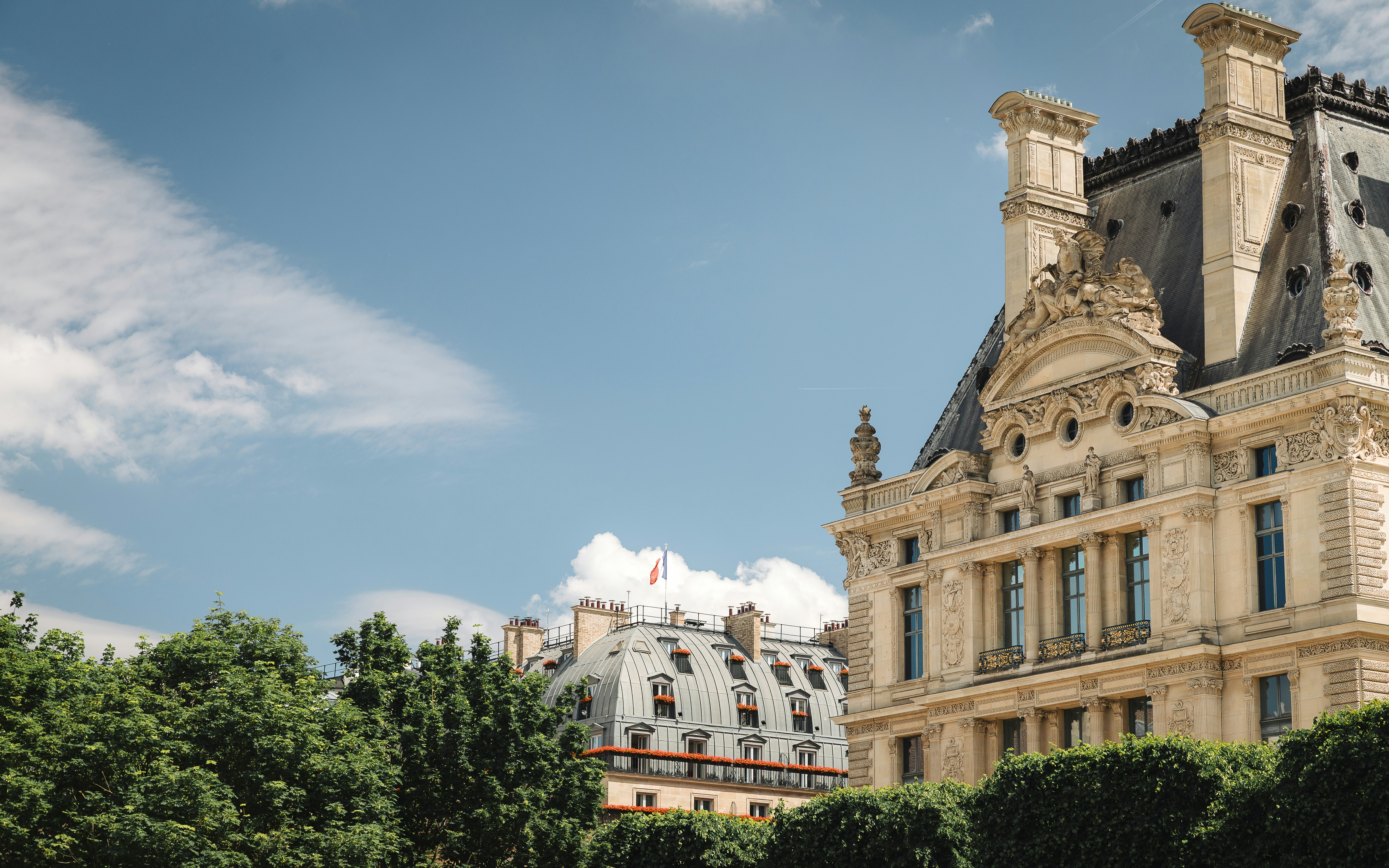 Castle Facade Under Bright Parisian Sky