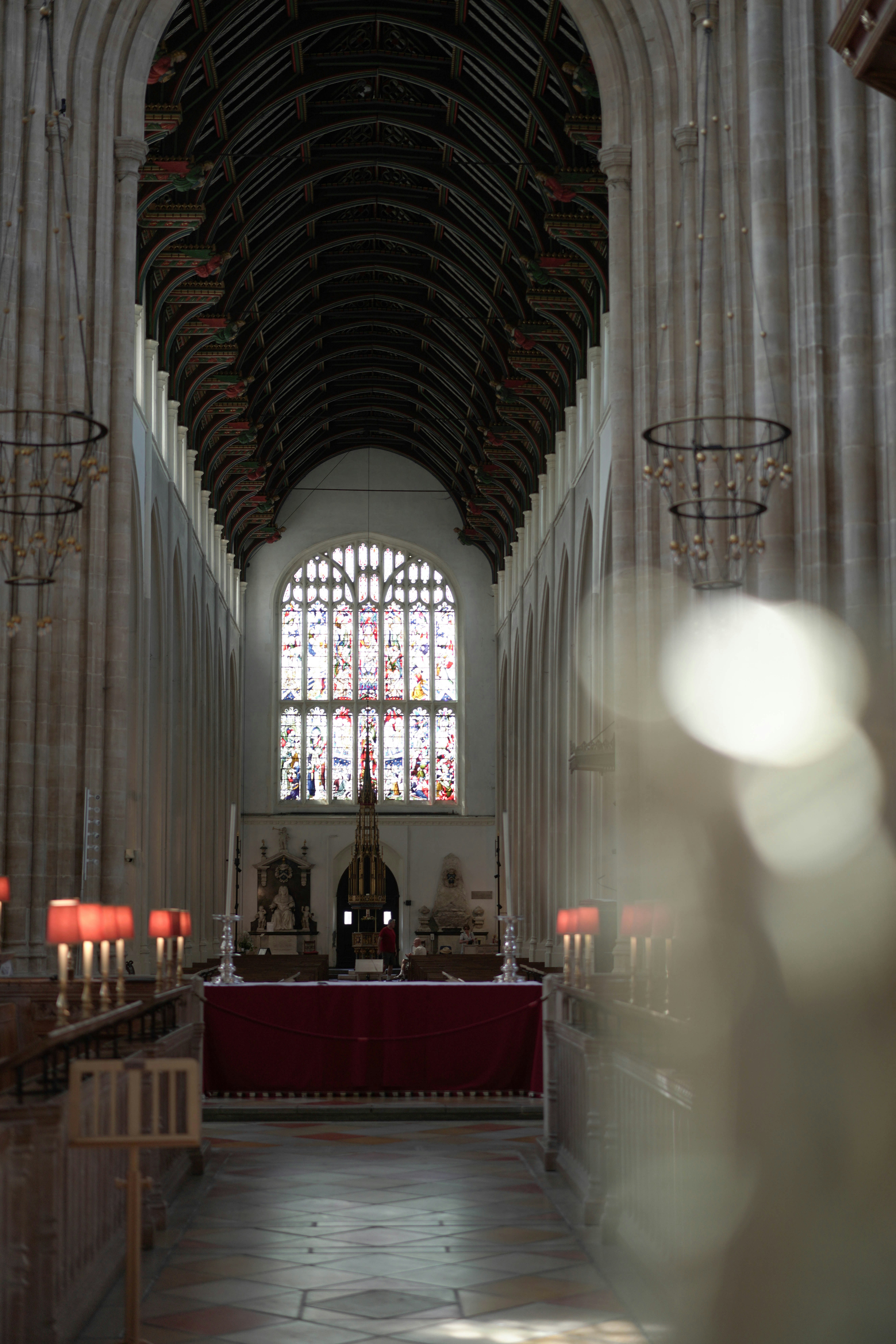 Stained Glass Cathedral Corridor: Light Through the Aisle
