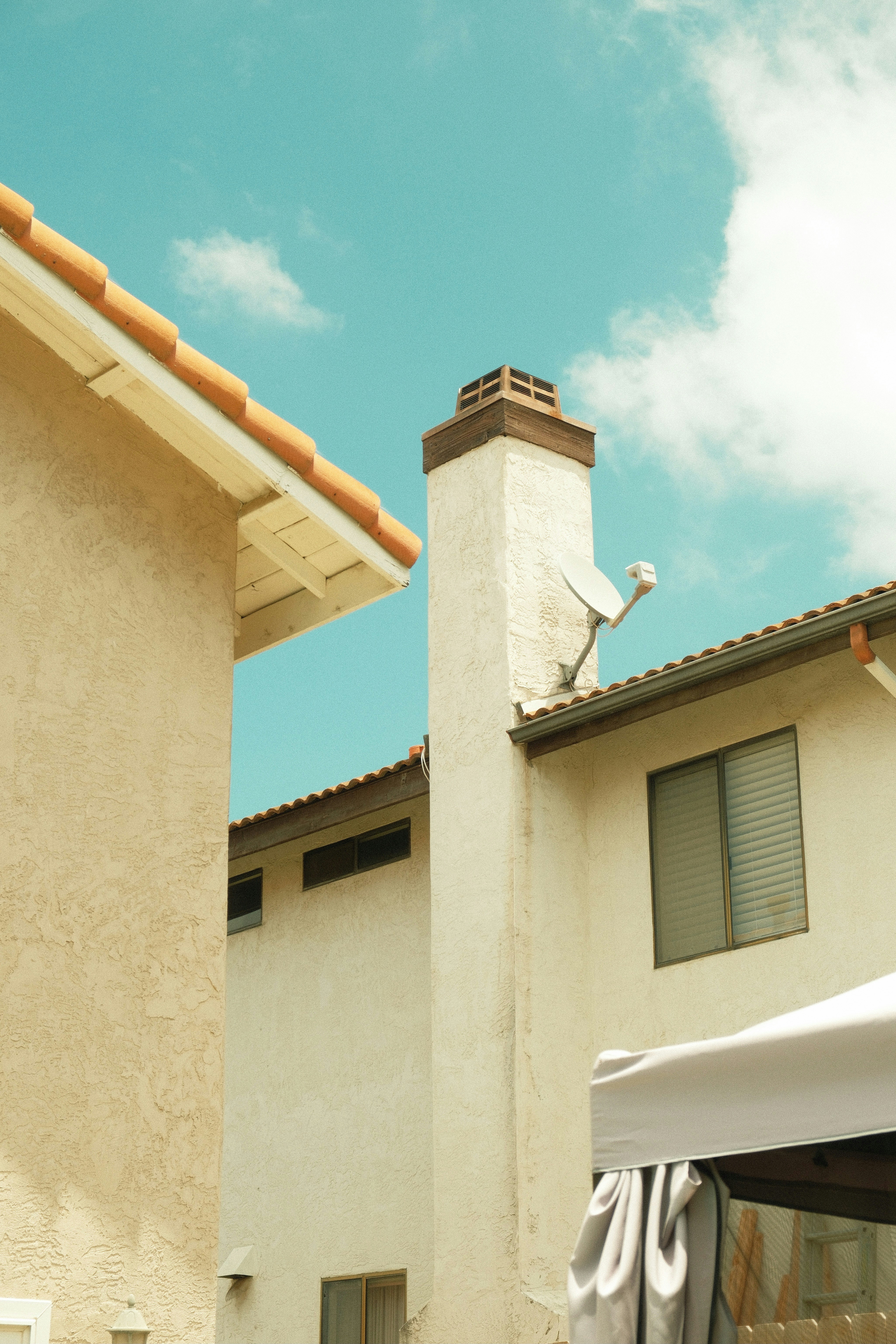 Terracotta Rooflines beneath a Clear Sky