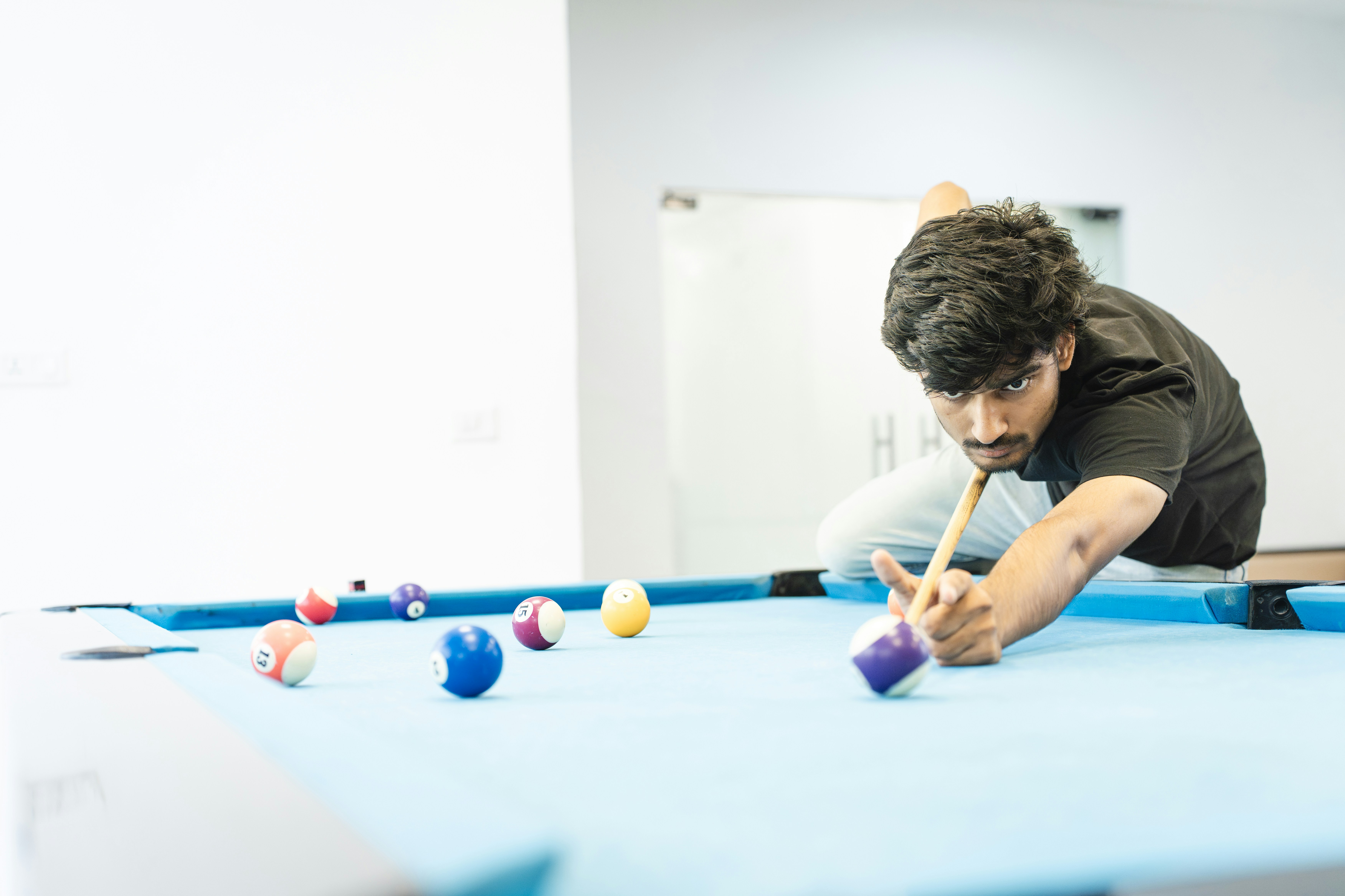 Focus on the Arc: A Pool Shot In Quiet Intensity