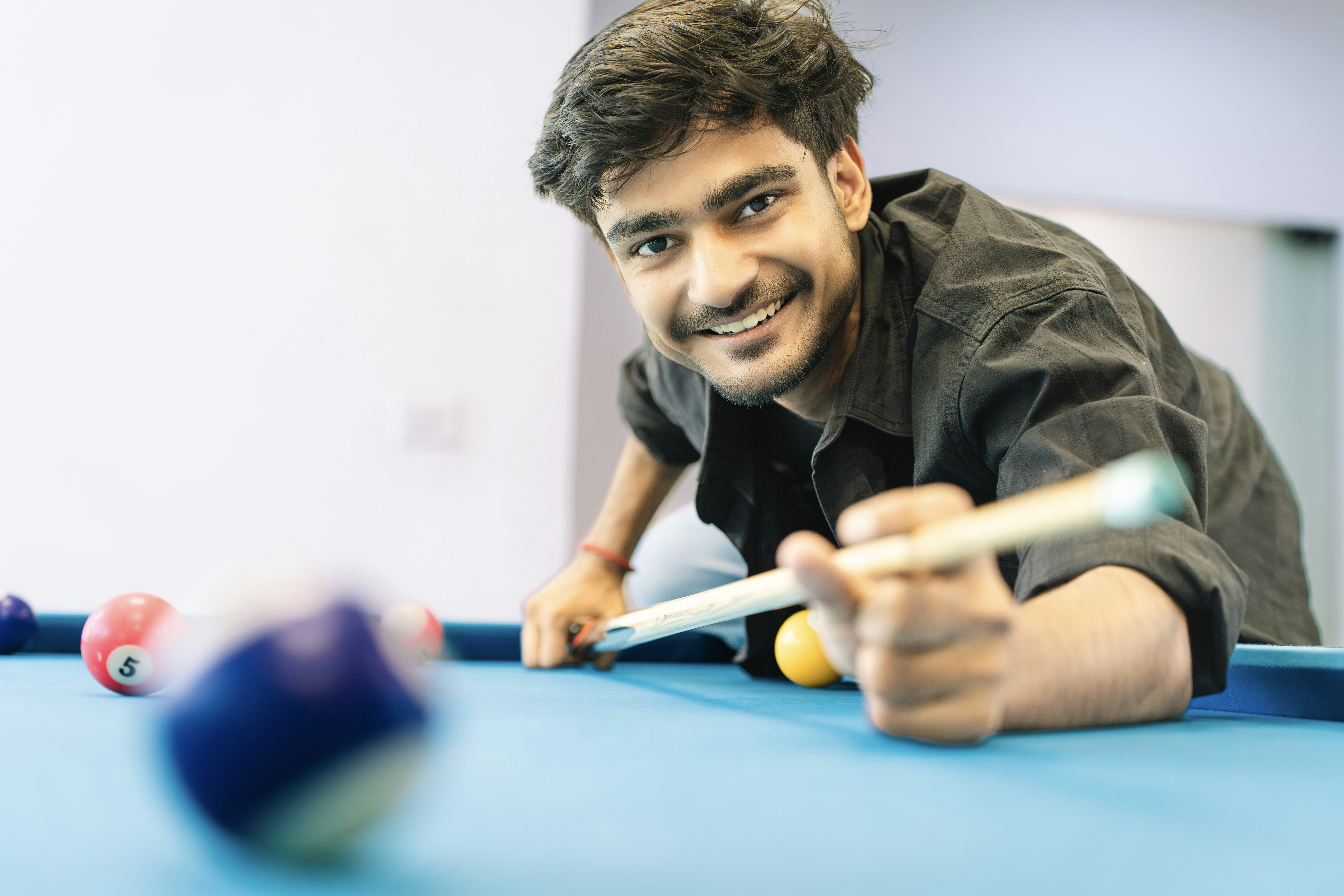 Focused Break: A Pool Shark Lines Up the Shot