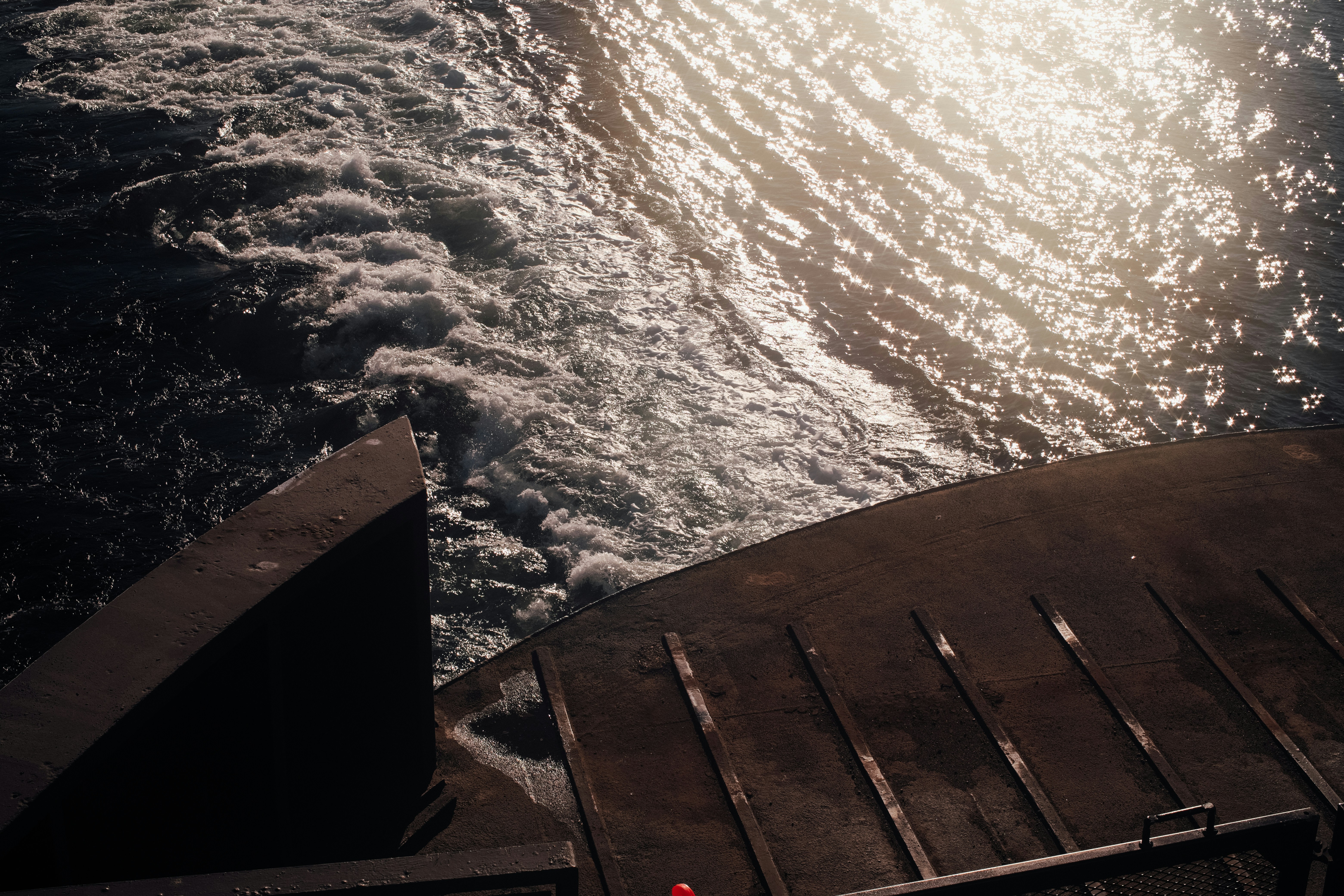 Industrial Pier Edge Overlapping the Tide