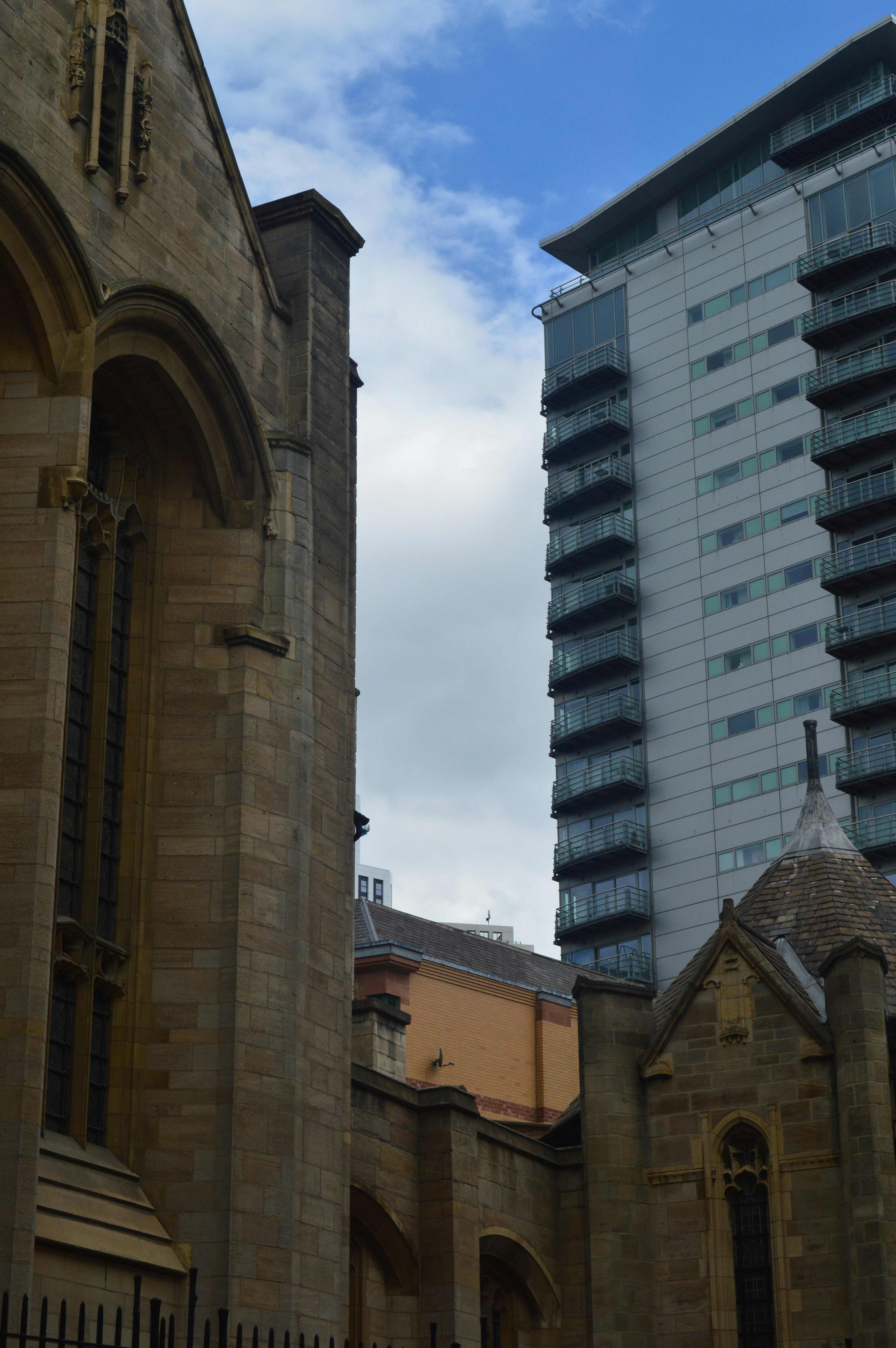 Between Stone Archways and Glass Horizons
