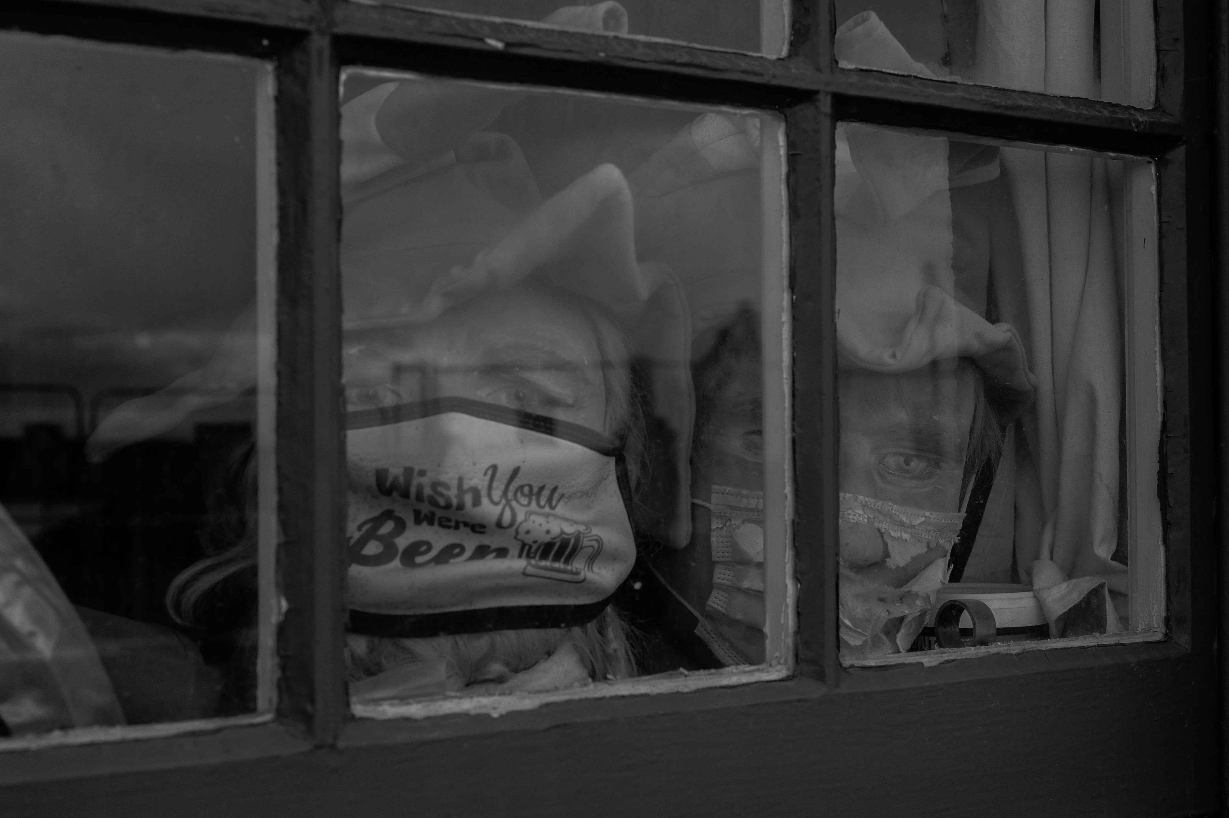 Whispers Through the Window: A Quiet Moment in Frosted Glass
