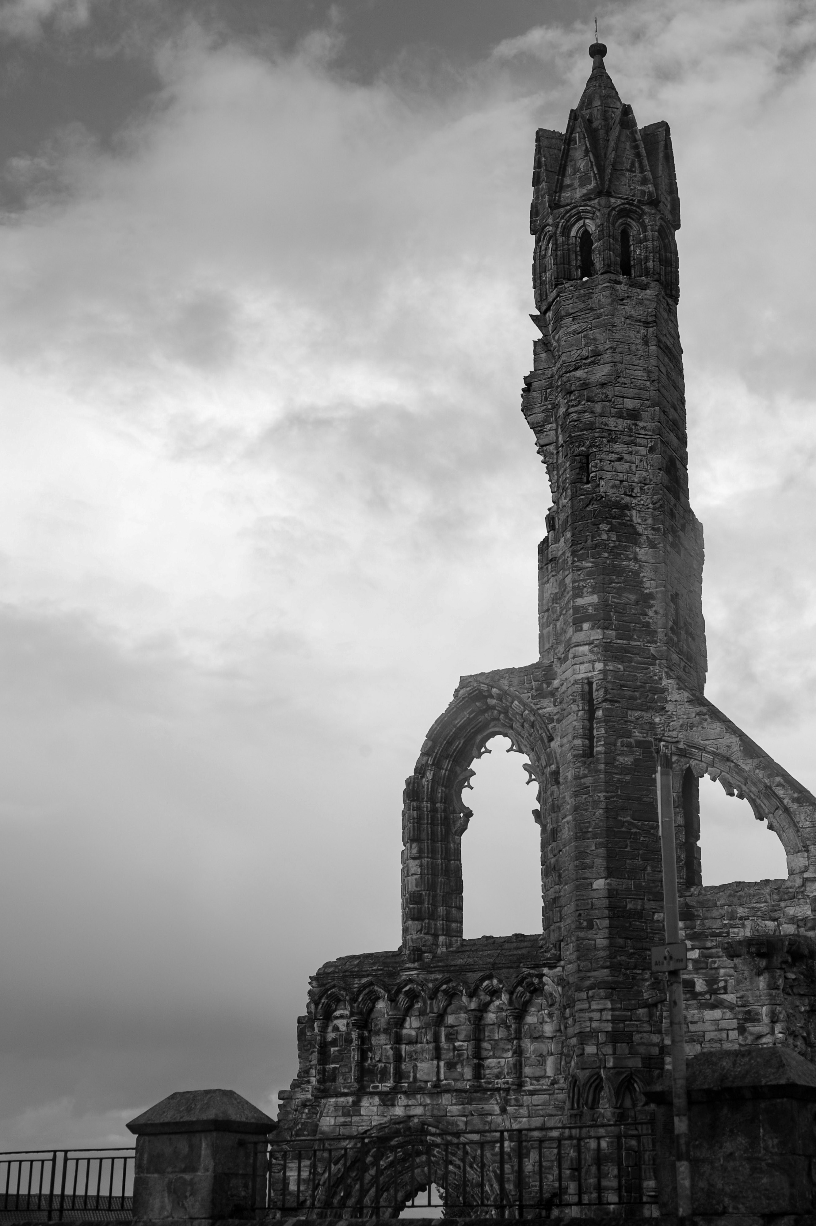 Ruined Watchtower Reaching Toward a Tempest Sky