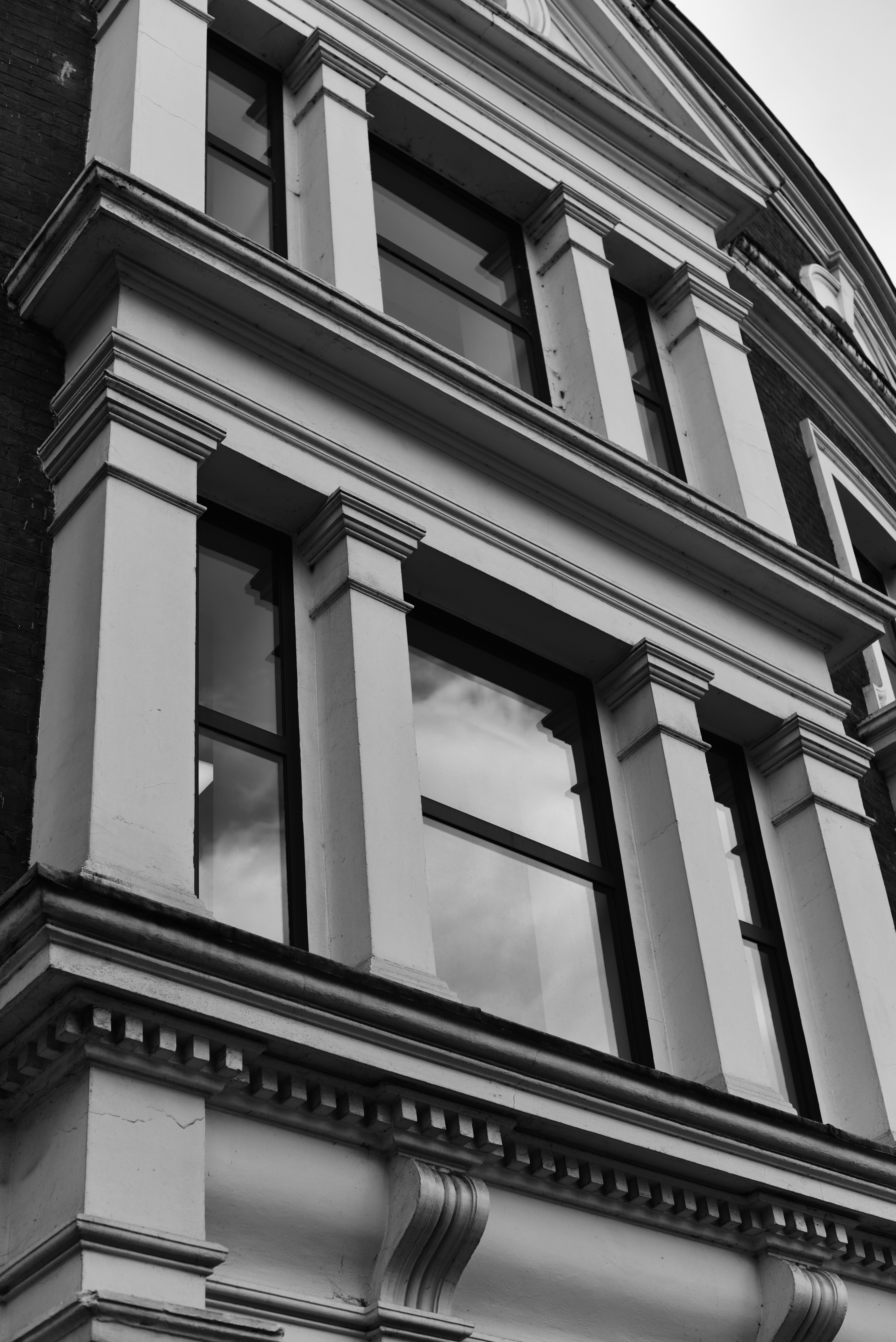 Architectural Portrait: The Facade’s Vertical Rhythm in Monochrome