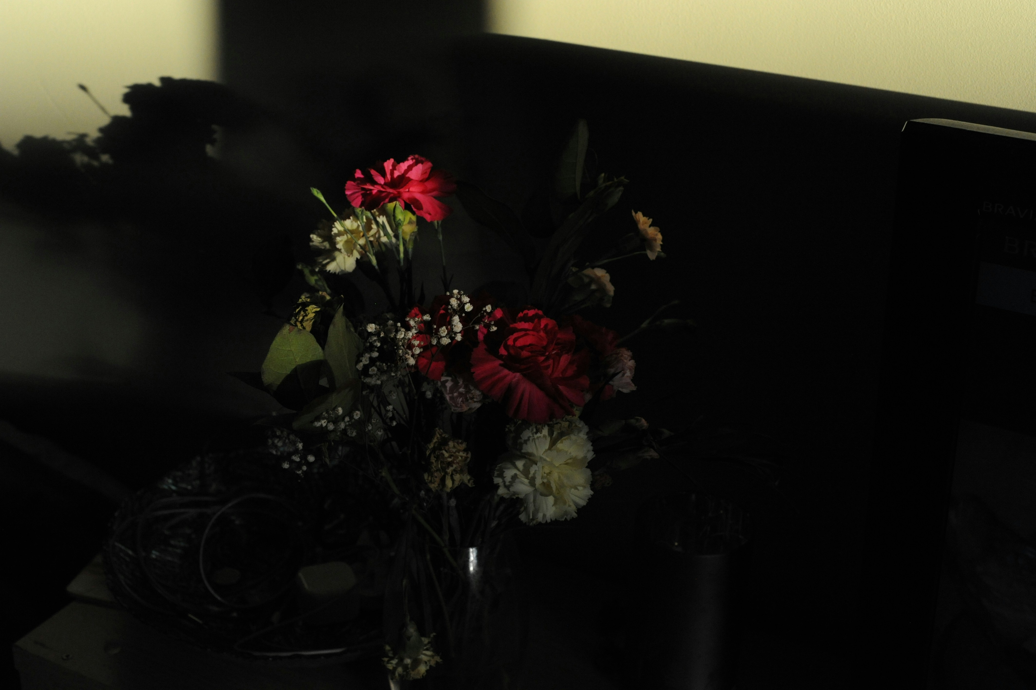 Dim Bouquet in Low Light: A Quiet Desk Still Life