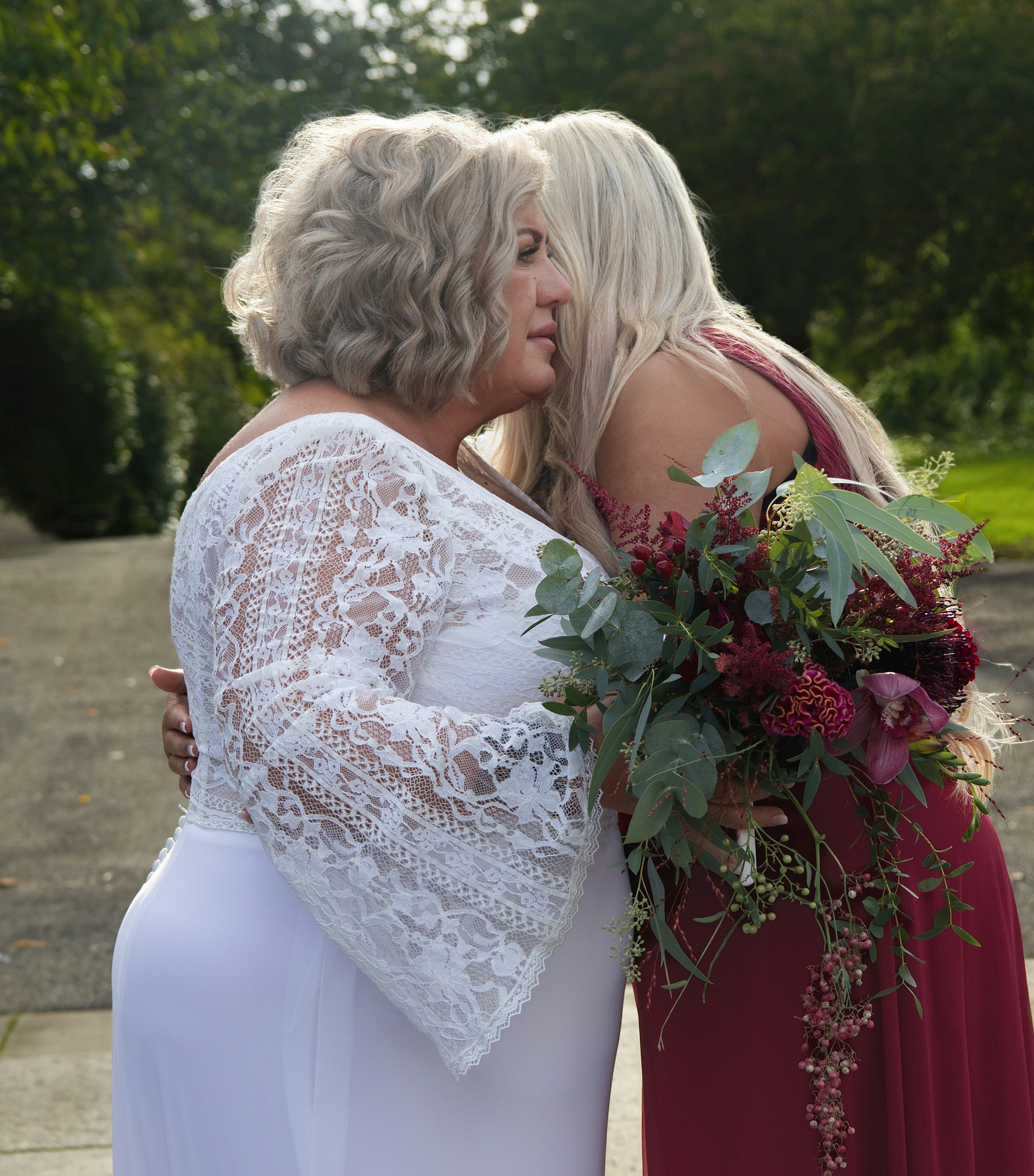 Whispered I Do: An Embrace in Evening Light