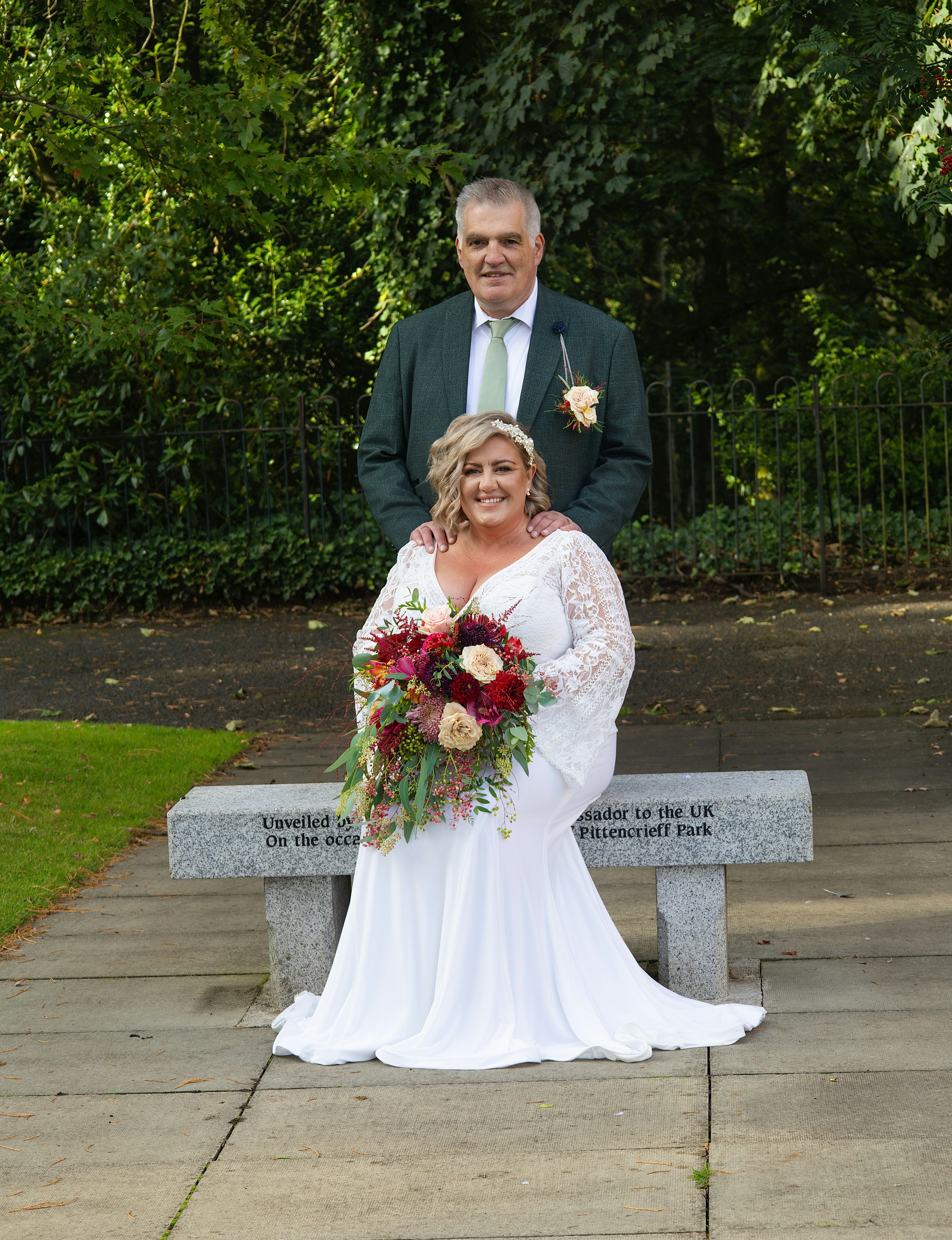 Bouquet and Bond: A Quiet Moment on the Park Bench