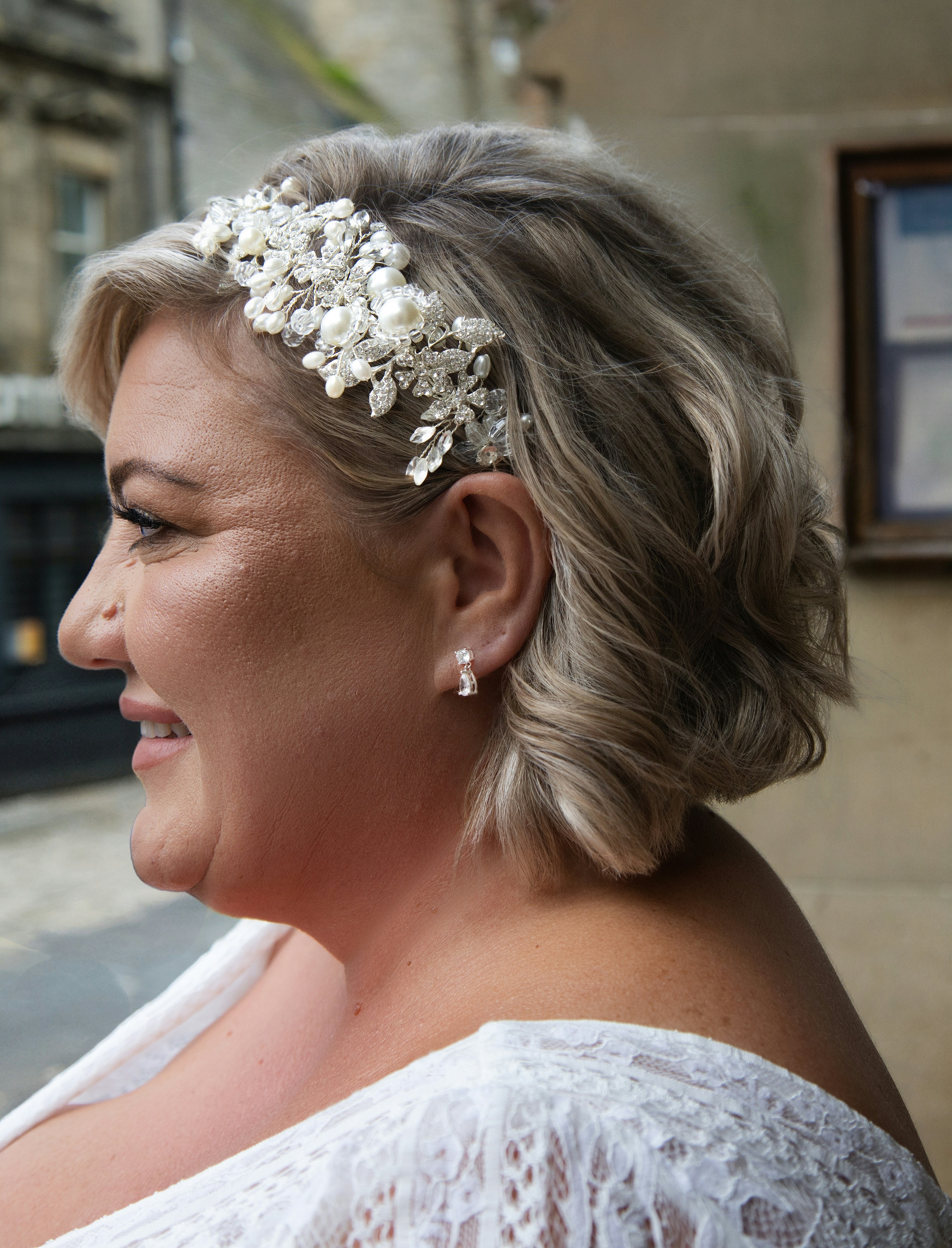 Elegant Bride in Pearl-Adorned Headband, Side Profile Portrait