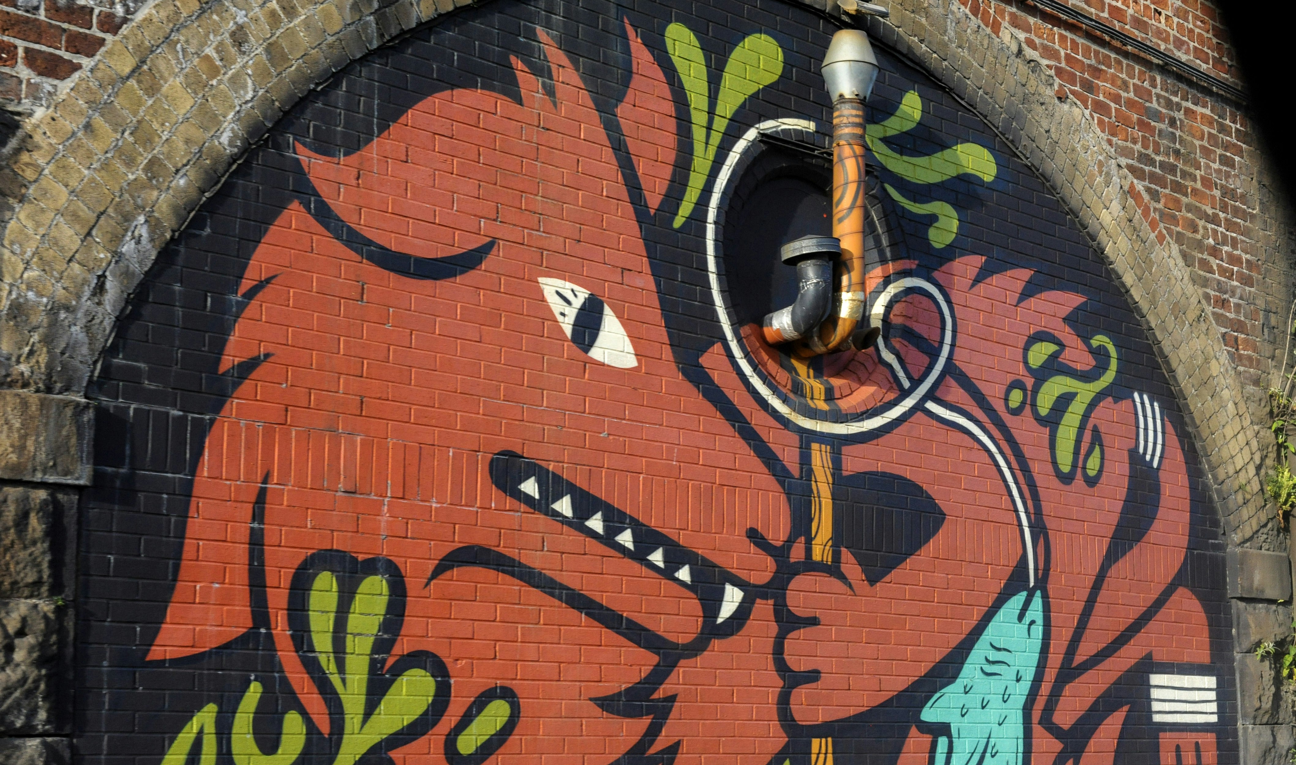 Urban Comet: Red Beast Against Brick Arc