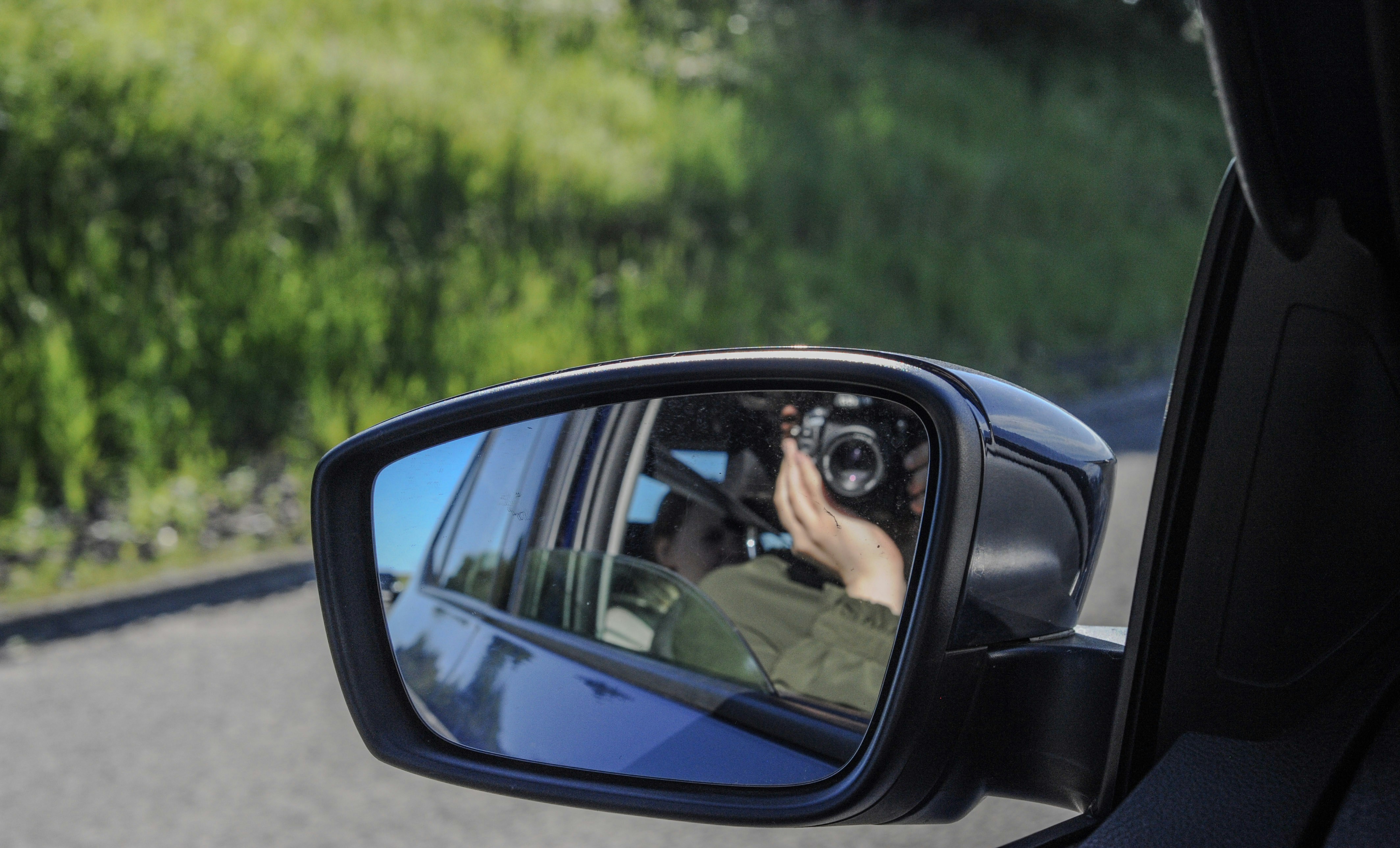 Rear-View Lens: A Car’s Gaze Reflected