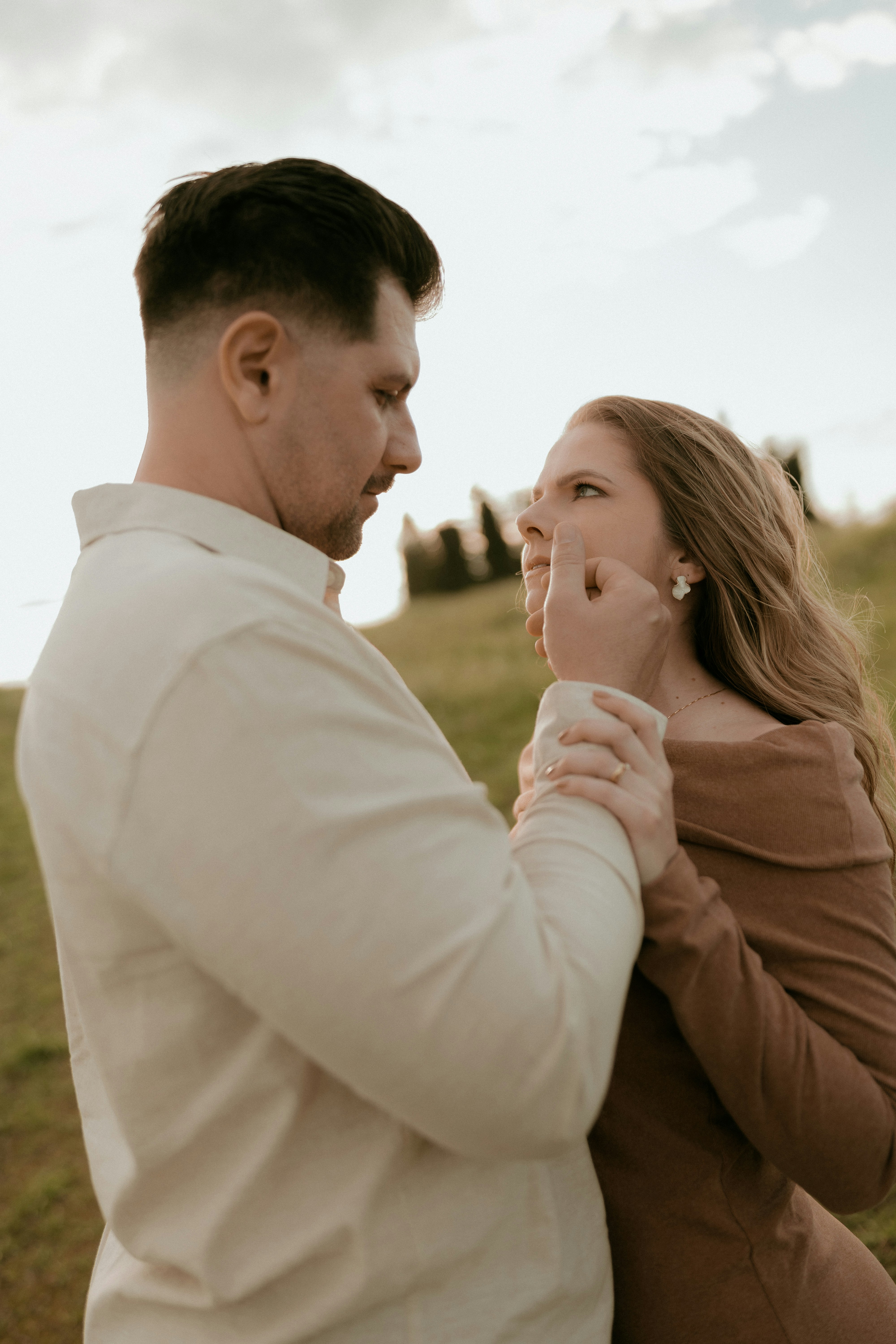Tender Confession: A Quiet Moment Between Two in Golden Hour Light