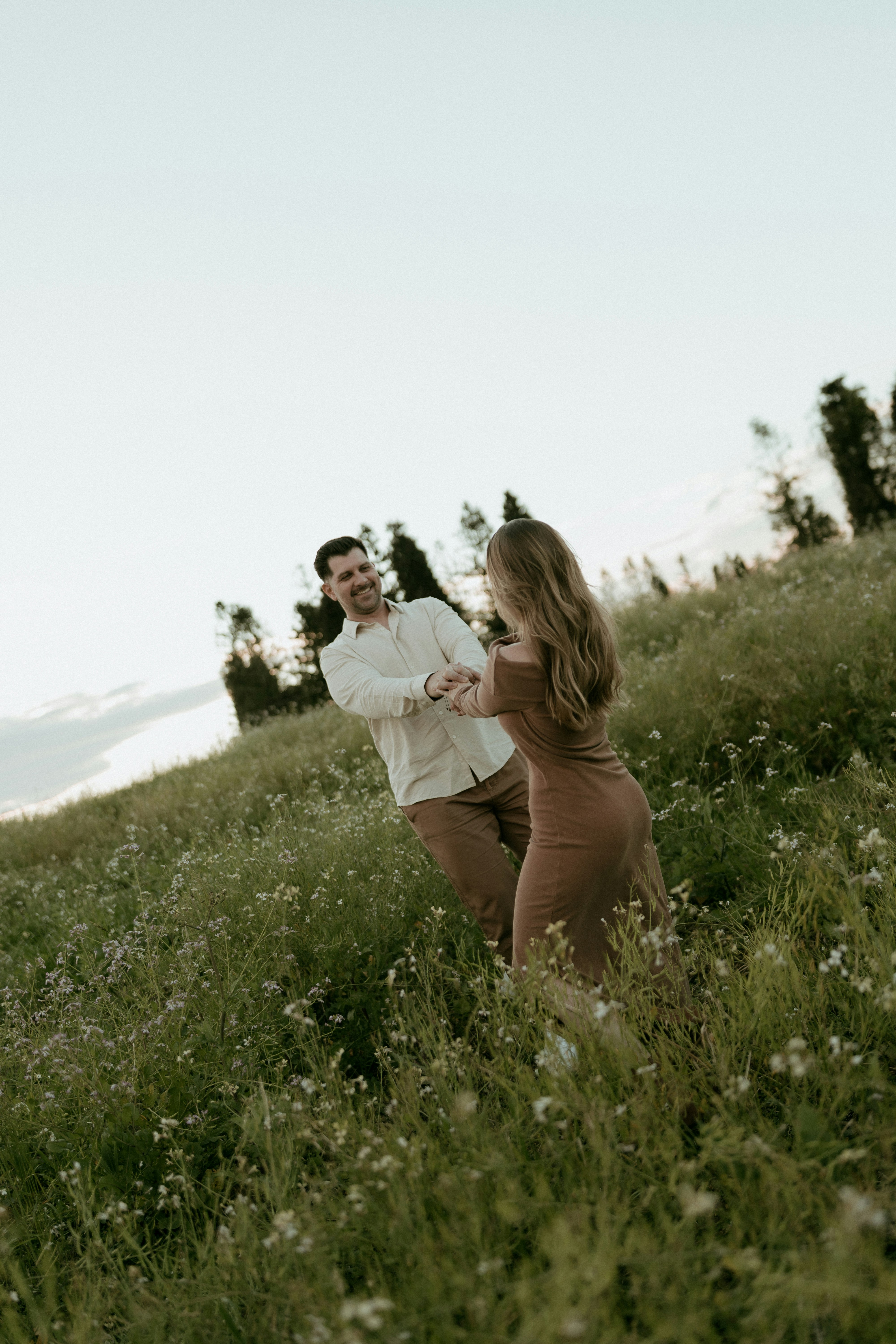 Dancing in the Meadow: Two Lovers in a Golden Field