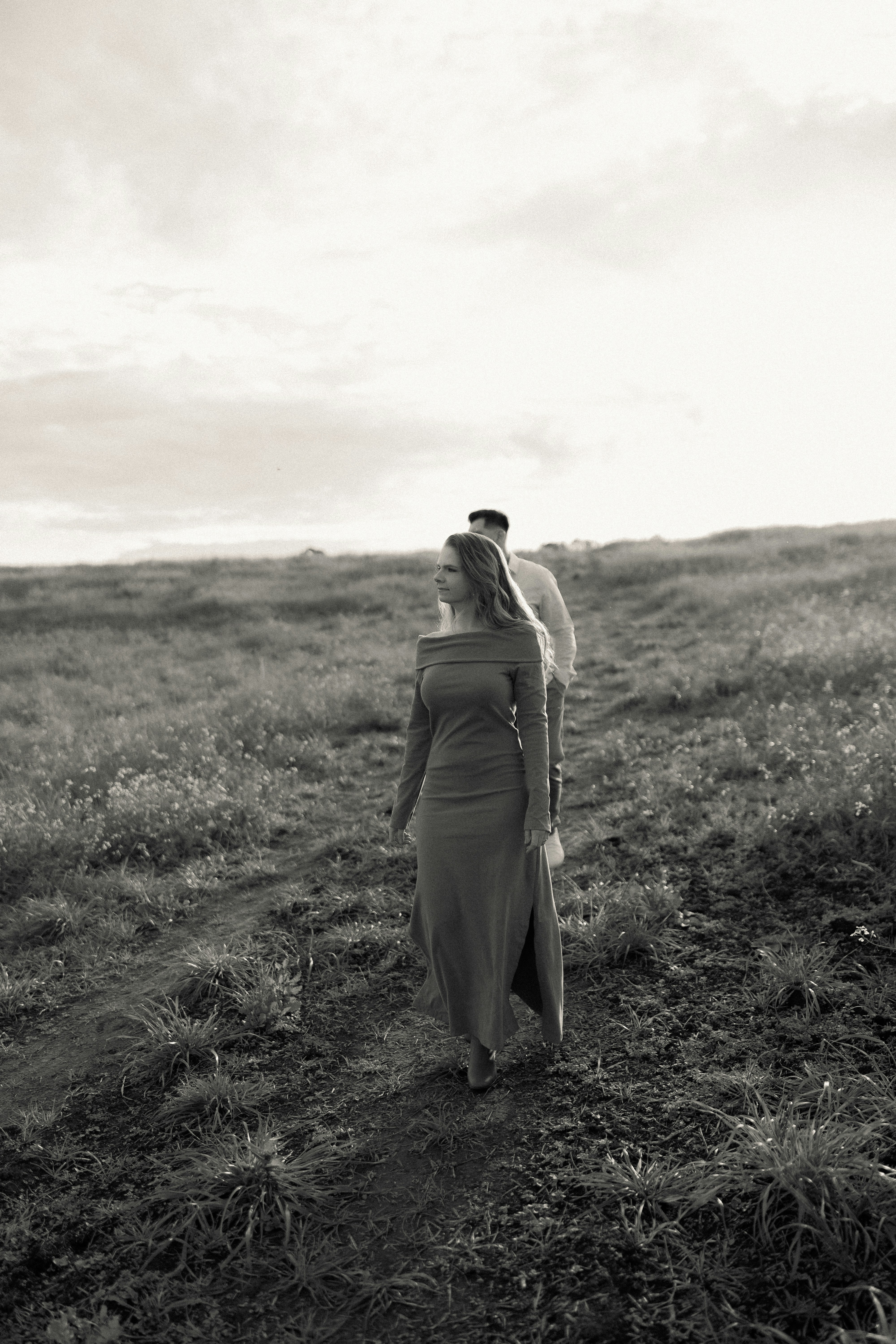 Two Silhouettes on a Quiet Hill