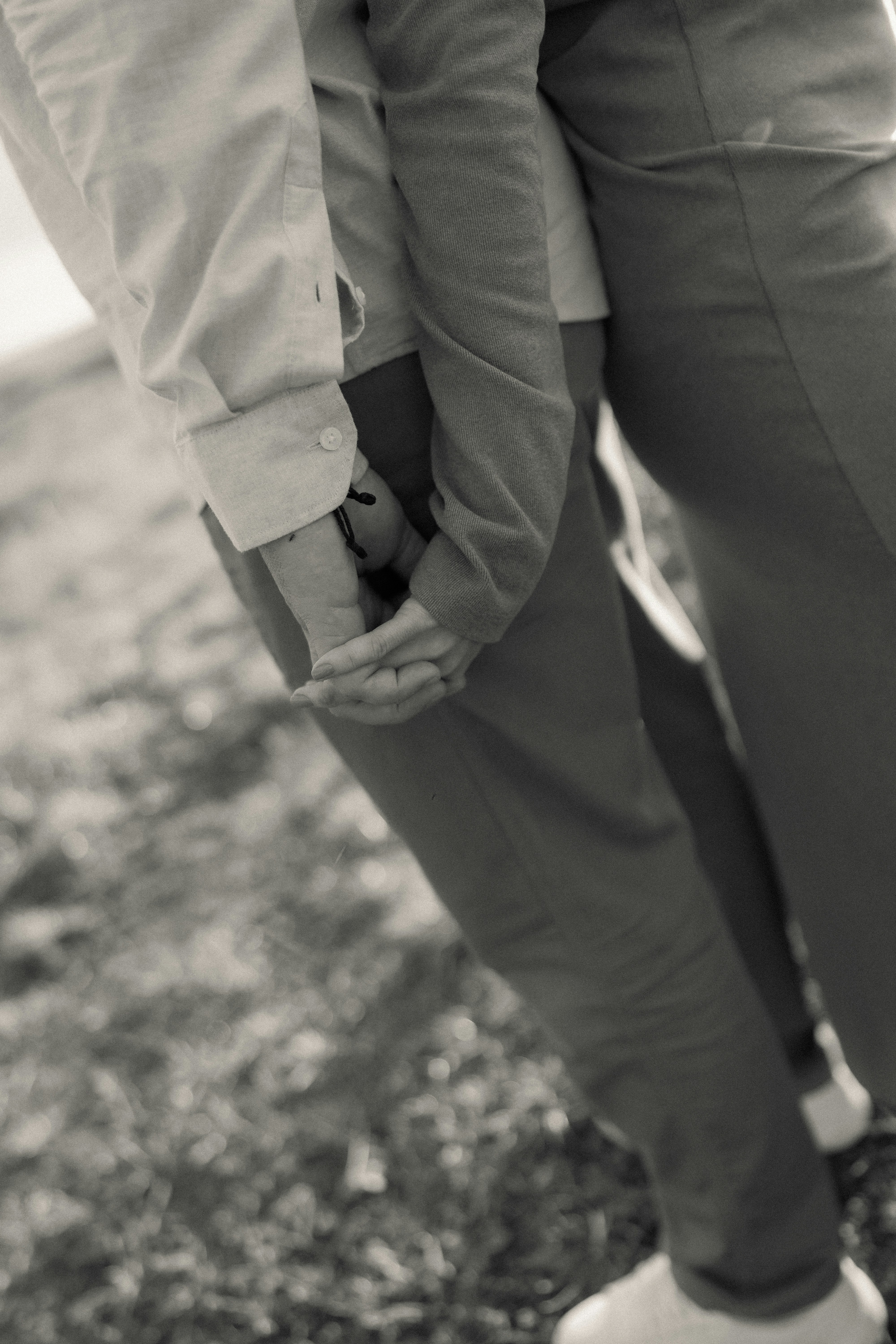 Holding Hands in Soft Sepia: A Quiet Moment Between Two