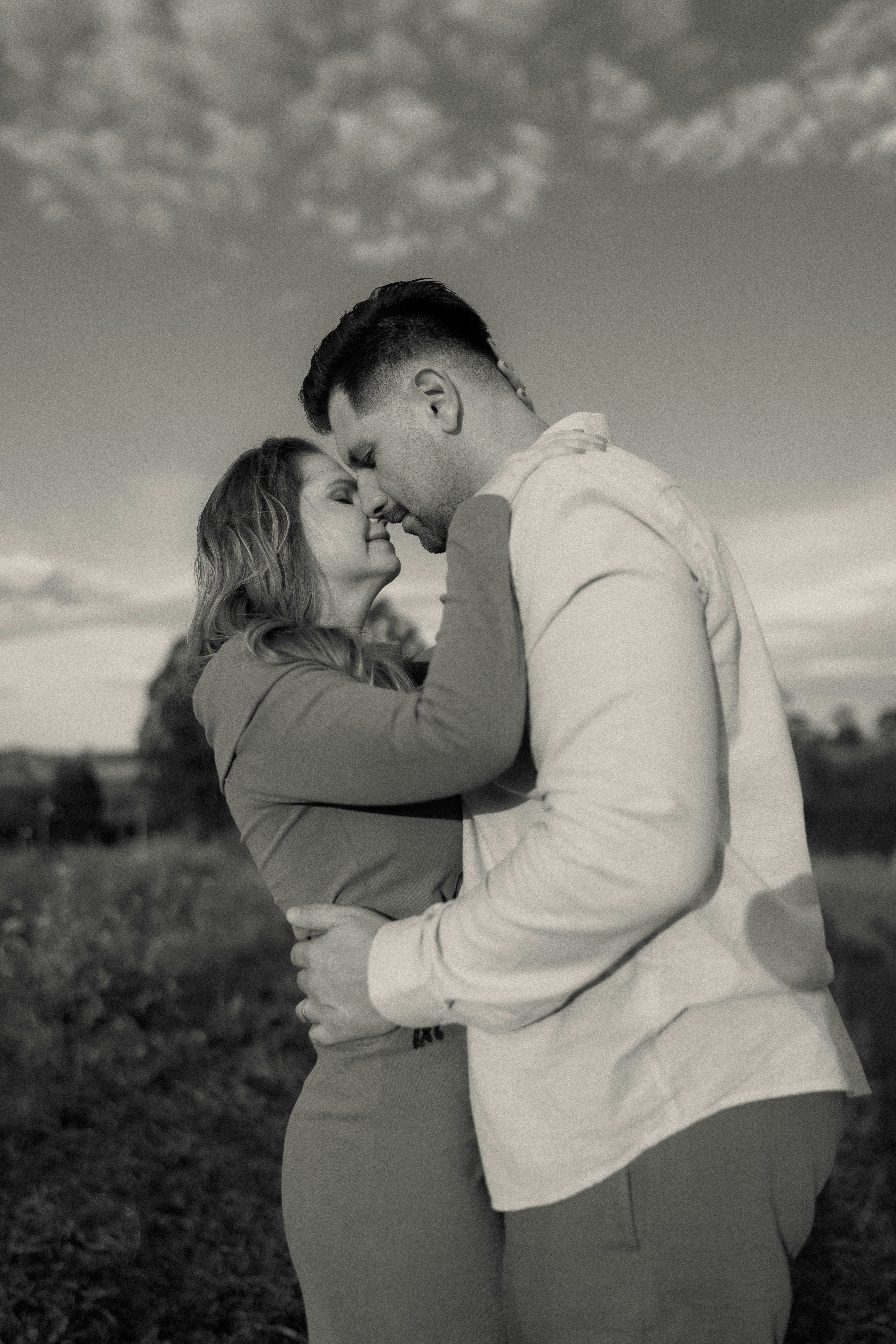 Close Embrace at Dusk: A Quiet Moment Between Lovers
