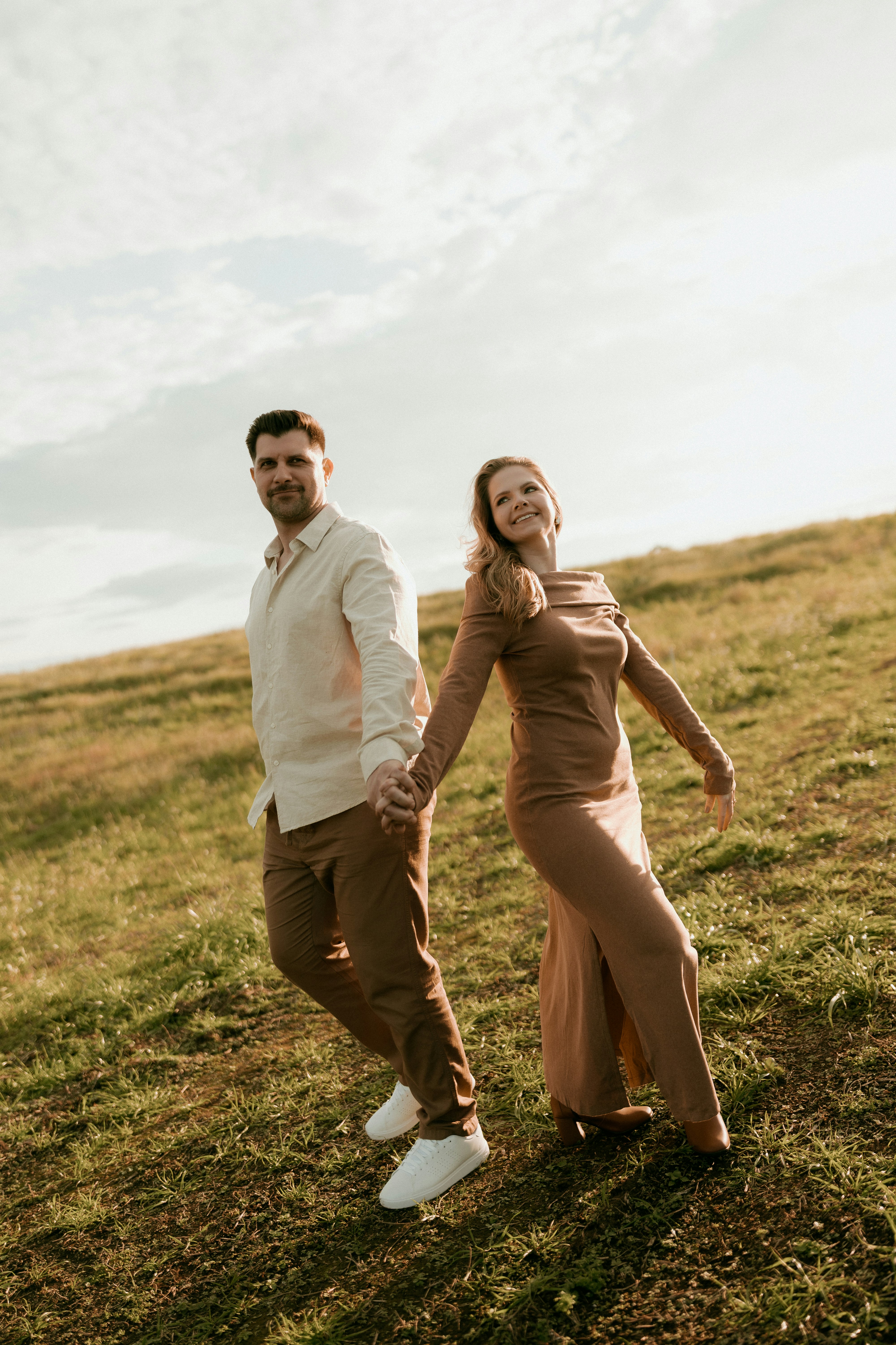 Holding Hands on the Hill: A Moment of Quiet Togetherness