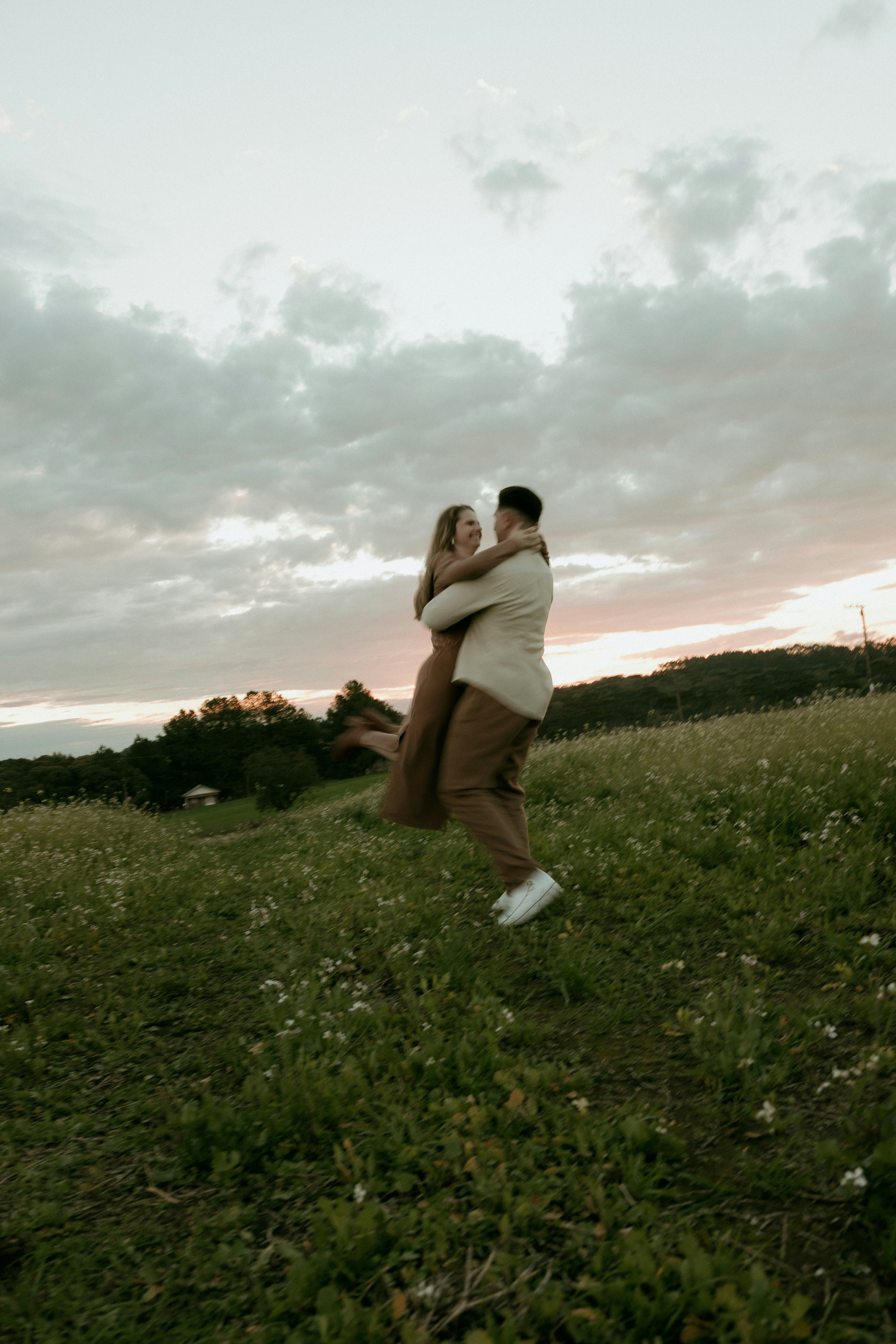 Leap of Joy in a Field at Sunset