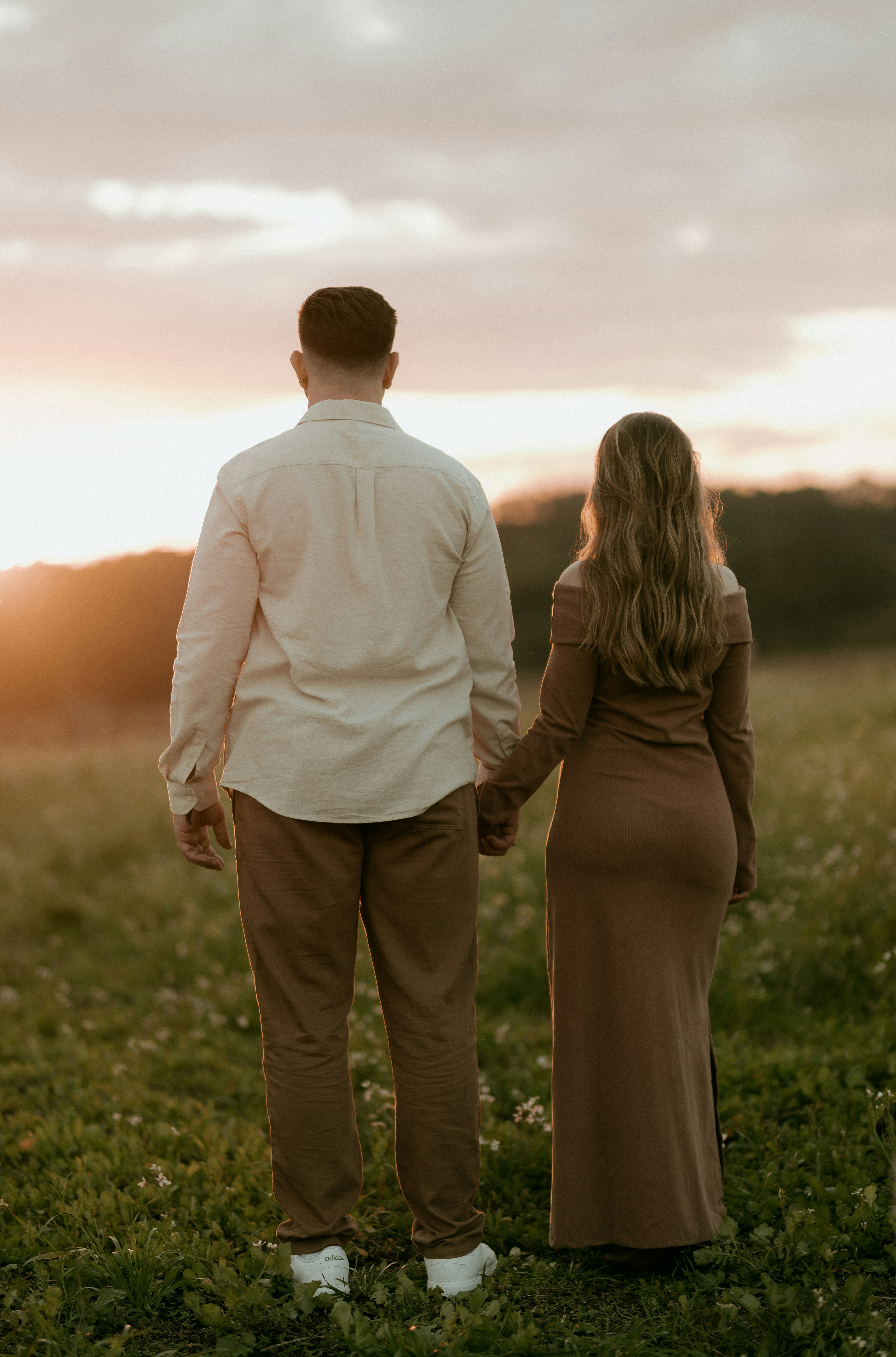 Sunset Walk: Holding Hands into the Golden Hour