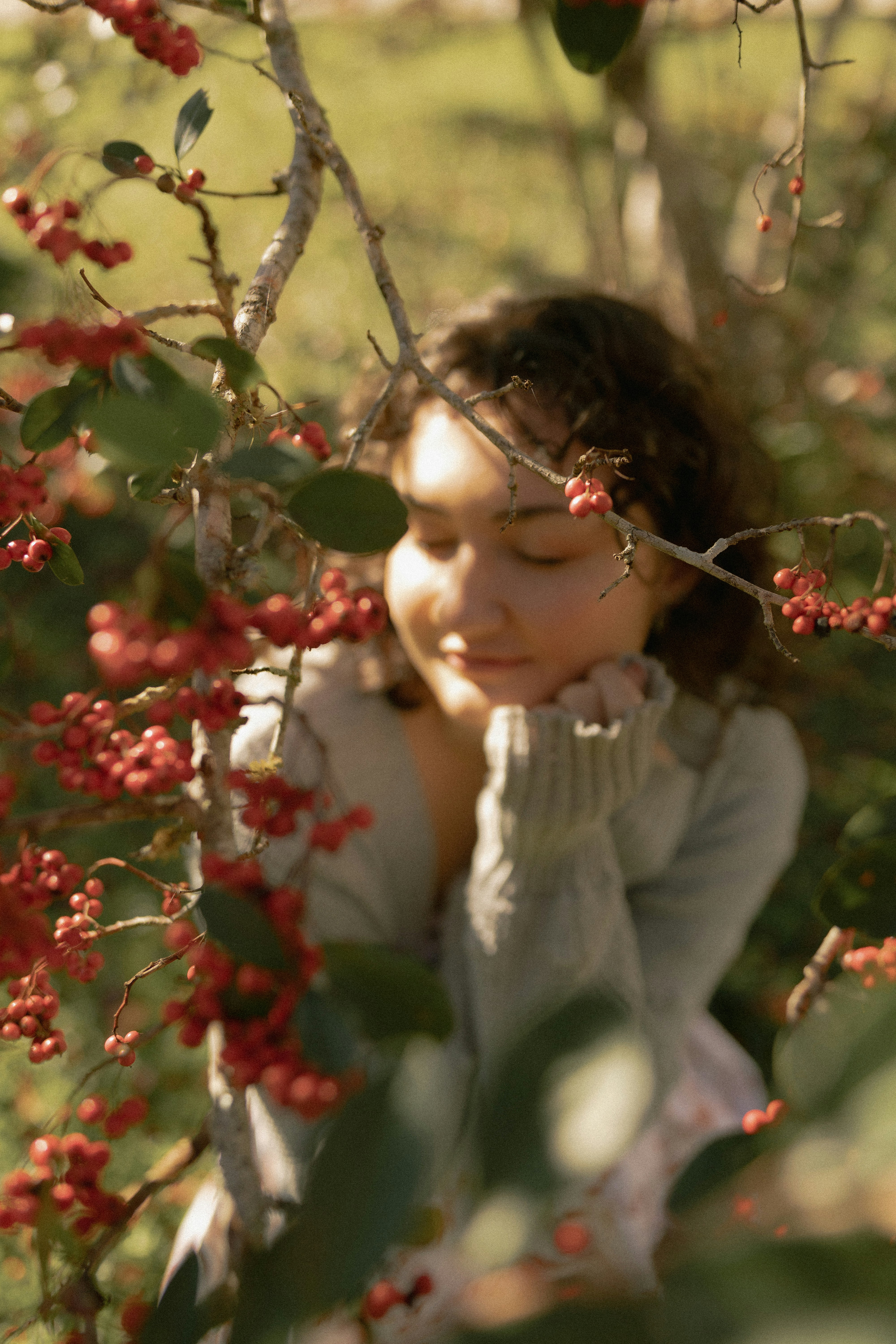 Quiet Bloom: a Soft-Focused Portrait Through Red Berries