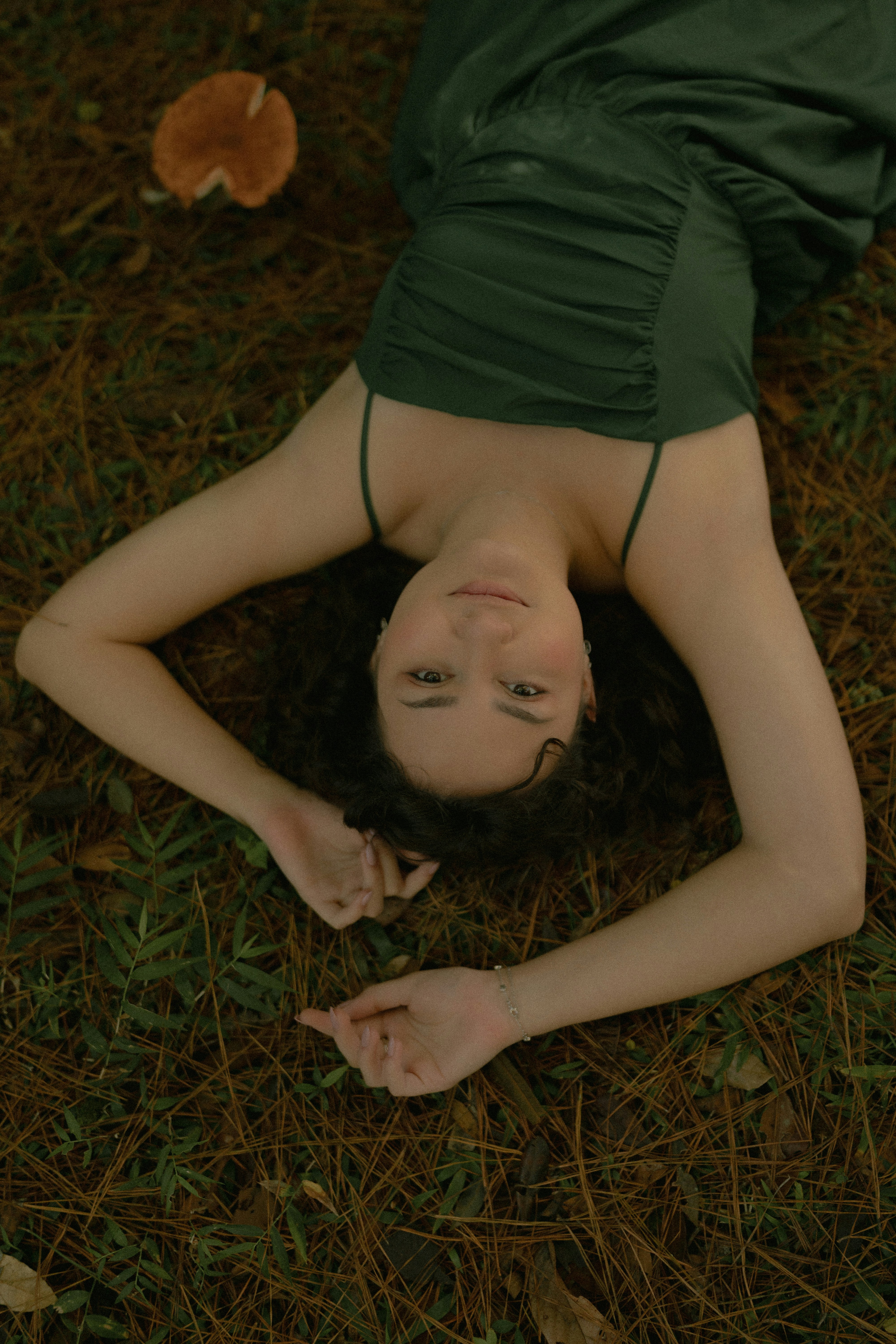 Green-gown Reverie: A Calm Pose in the Pine Needle Floor
