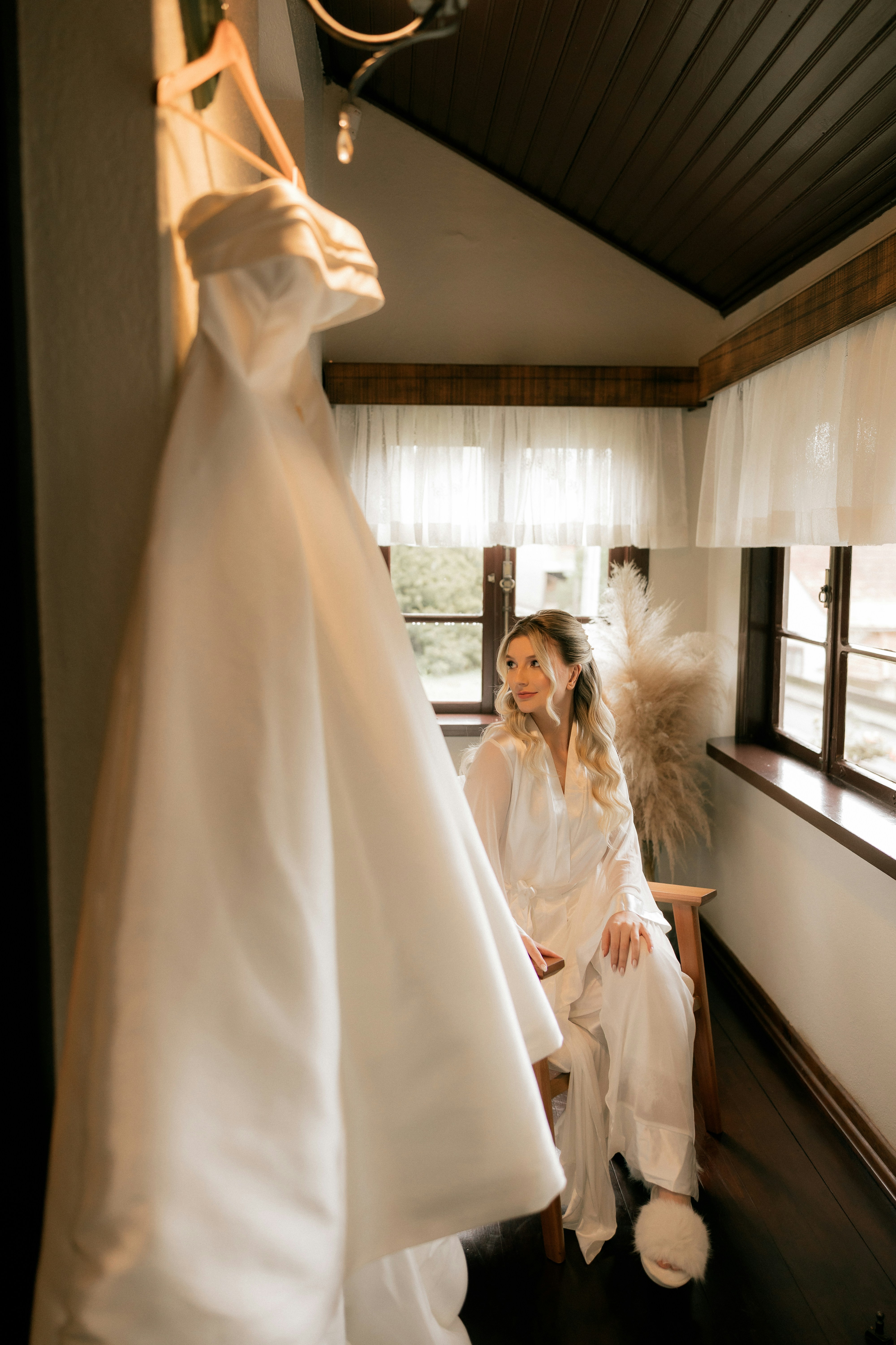 Bride in Soft Light: Quiet Moment by the Window