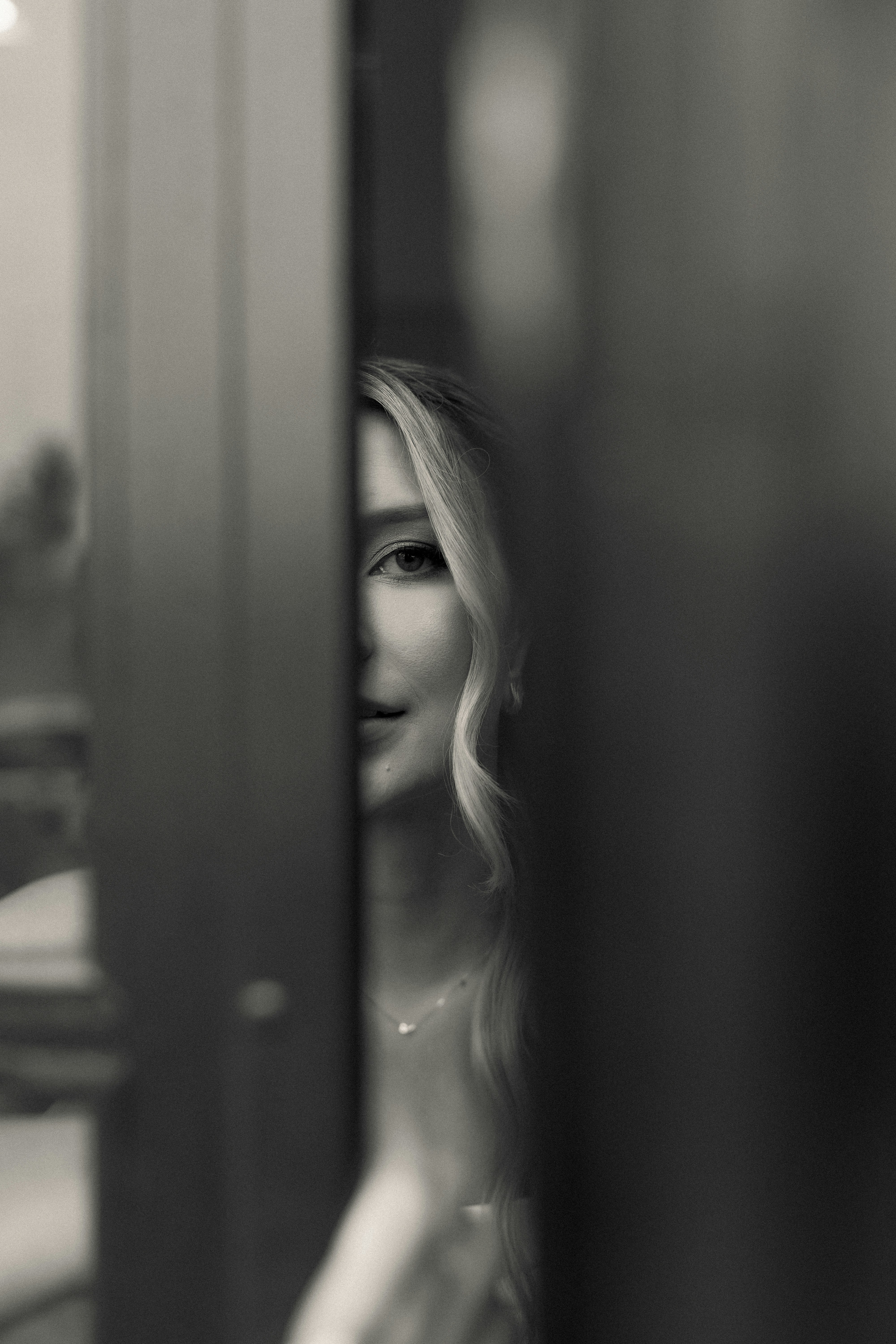 Partial Reveal: A Quiet Glance Through a Narrow Gap