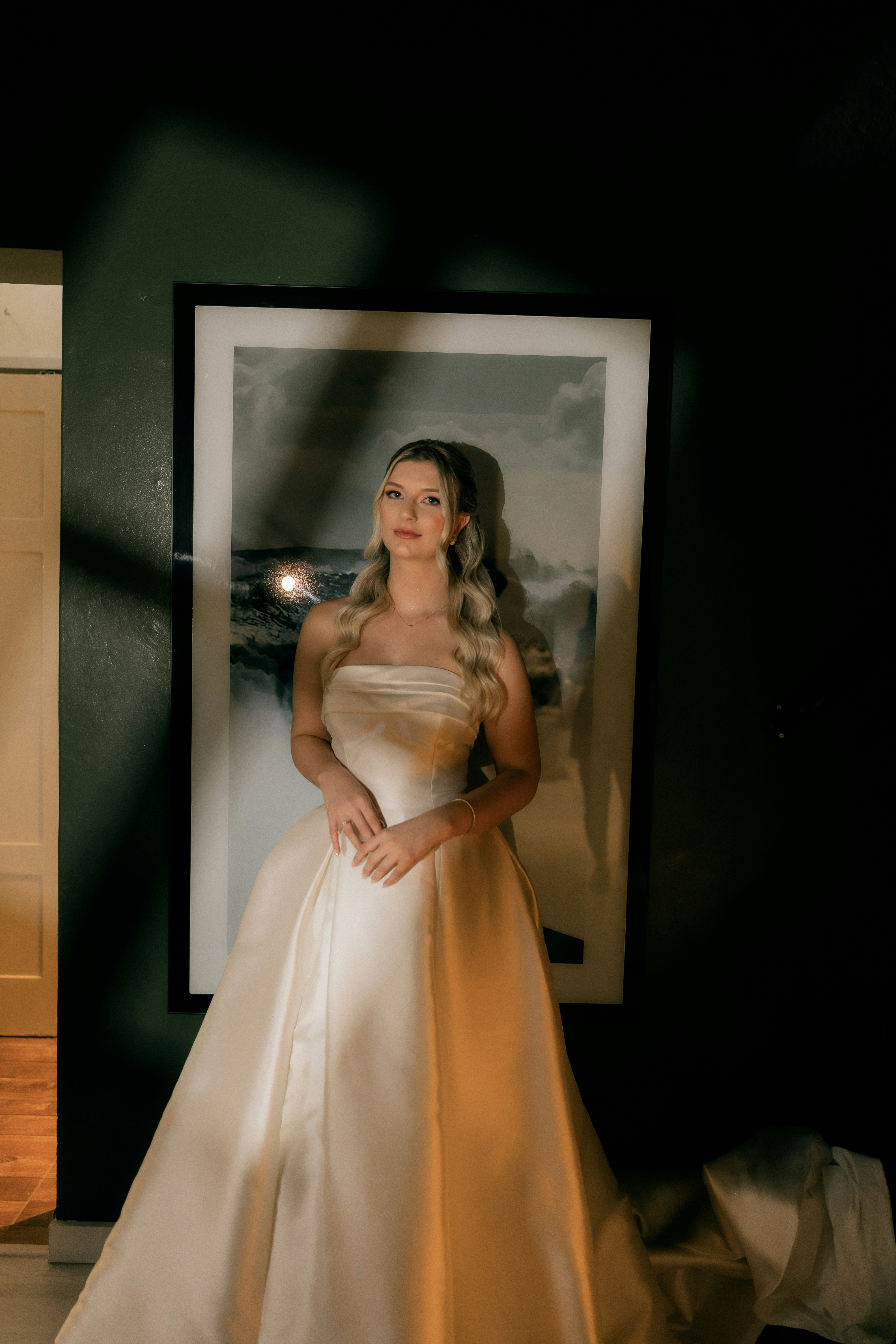 Elegance Beneath Dim Lights: Bride in a Starched Silence