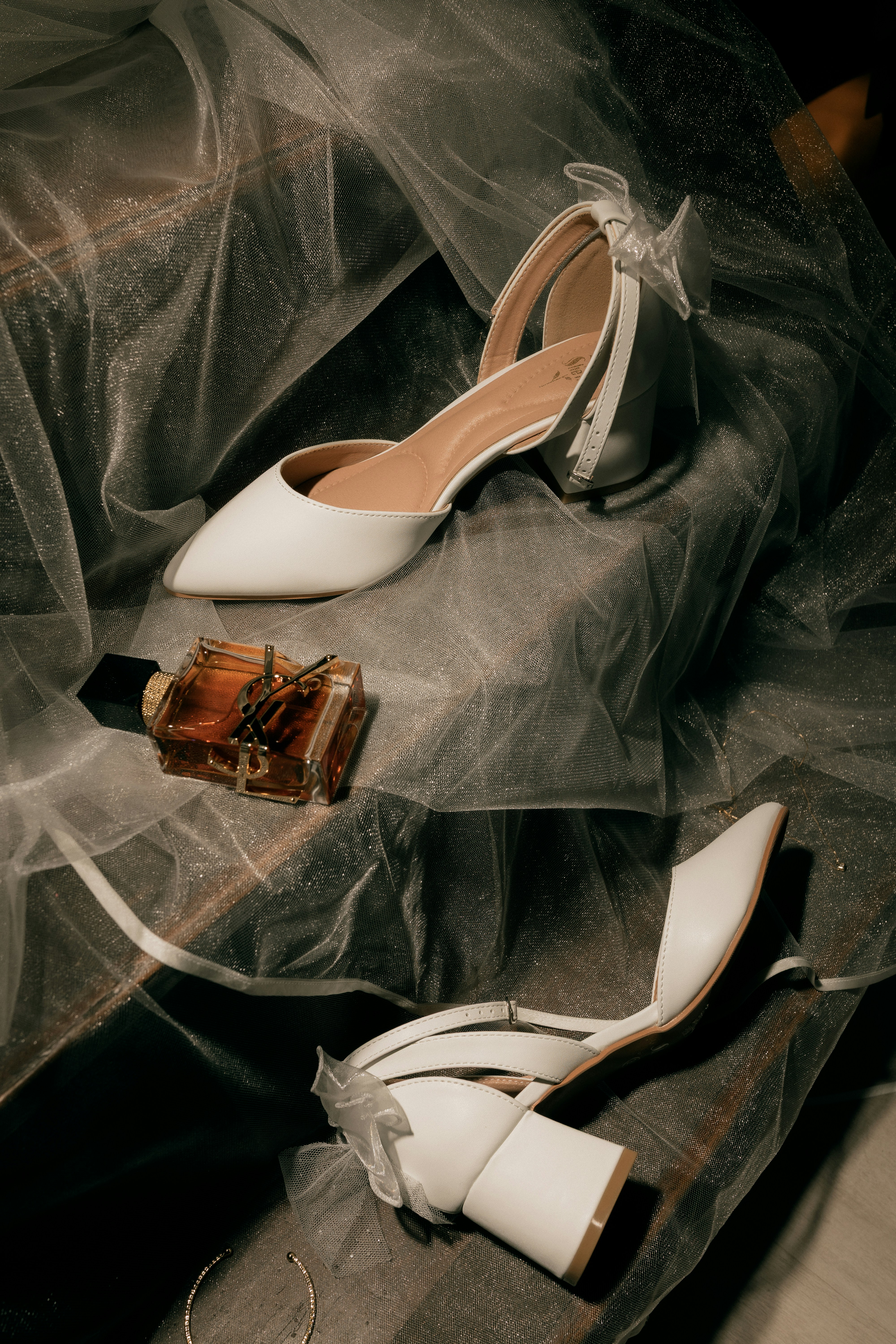White Heels and a Brushed Bottle: a Quiet Fashion Still Life