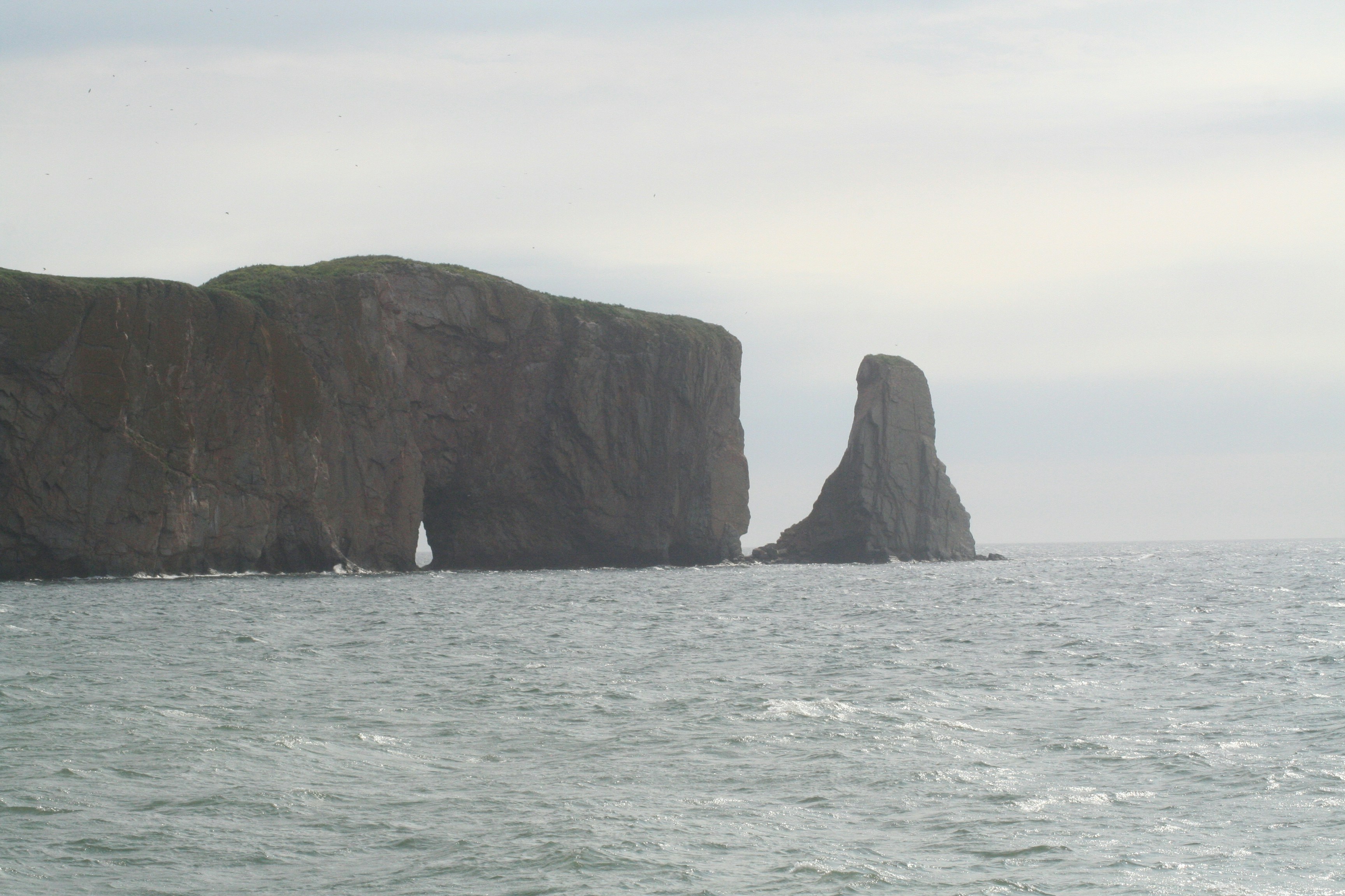 Sea Stack Duo: A Calm Line Between Cliff and Horizon