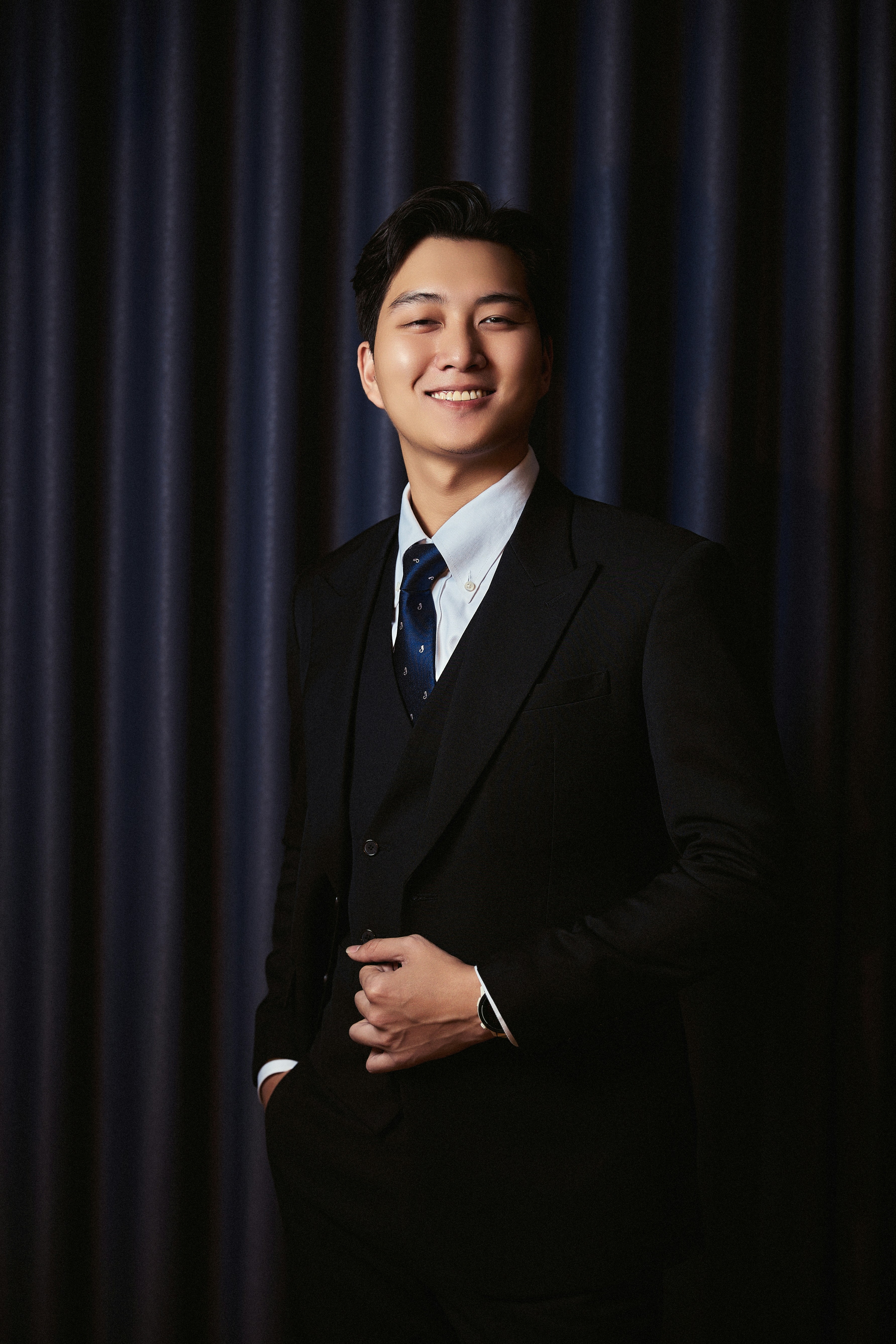 Dapper Confidence: A Portrait in Velvet Drapes