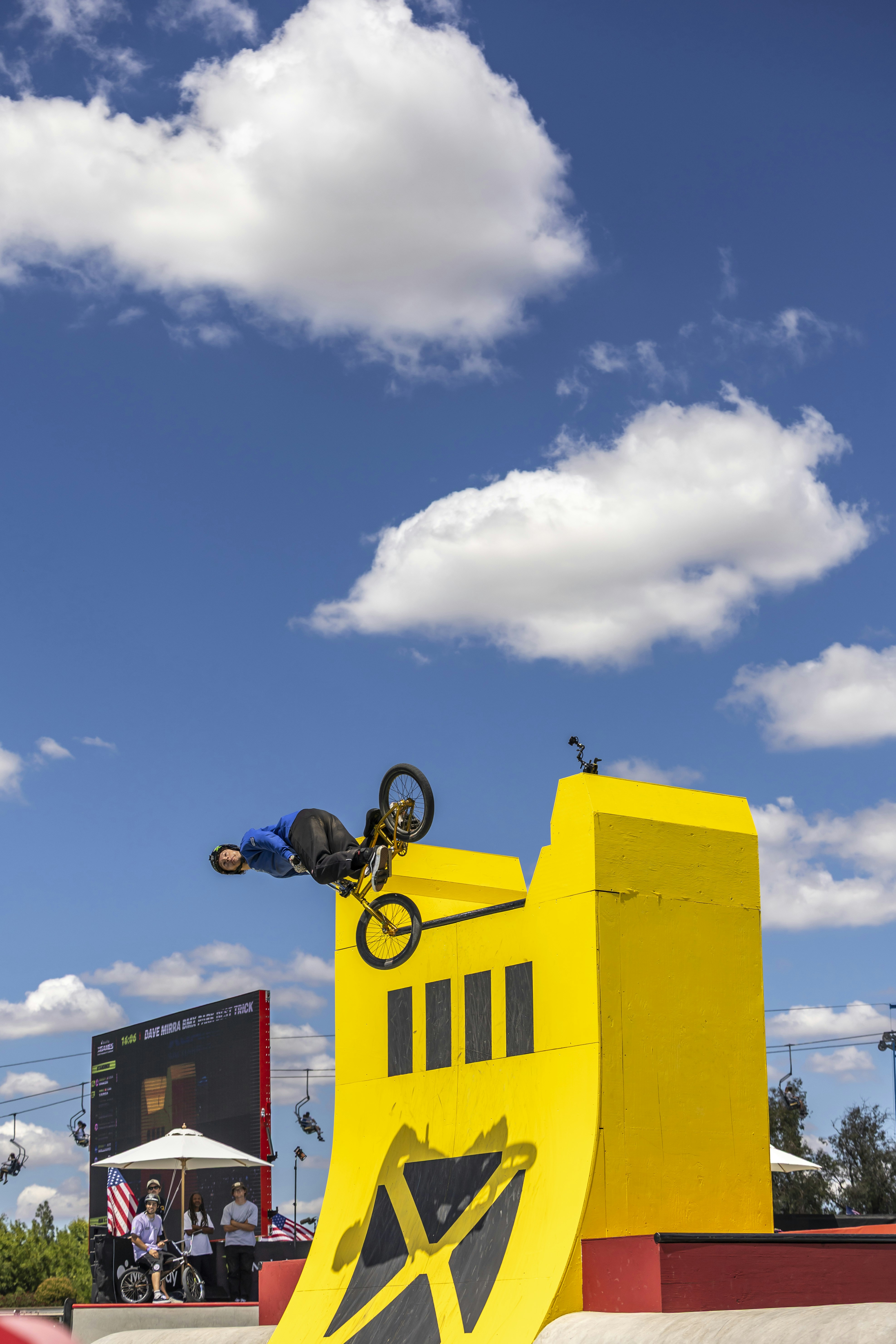 Yellow Ramp Dreams: A BMX Rider Clips the Sky
