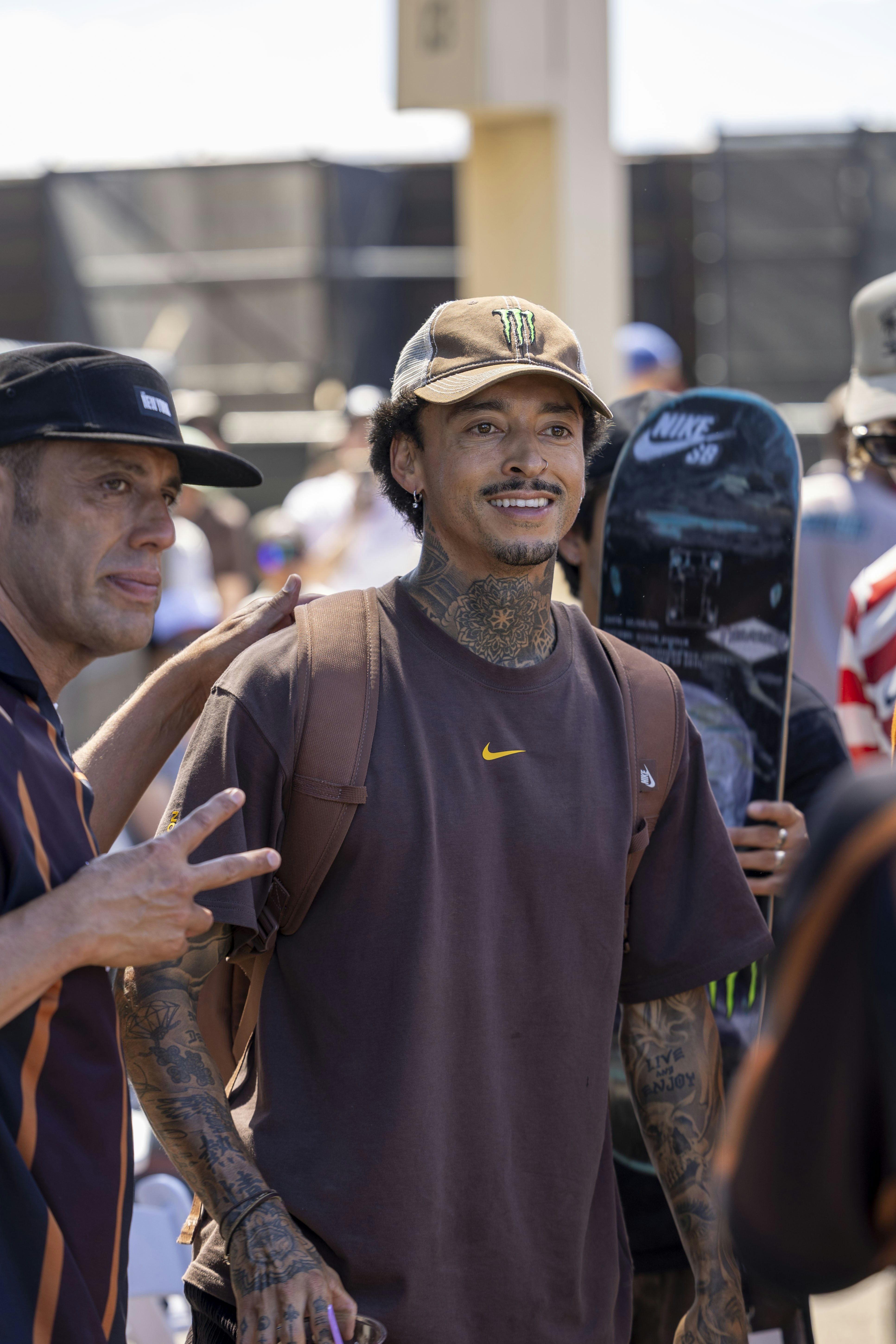 Skatepark Reunion: A Tattooed Moment of Focus