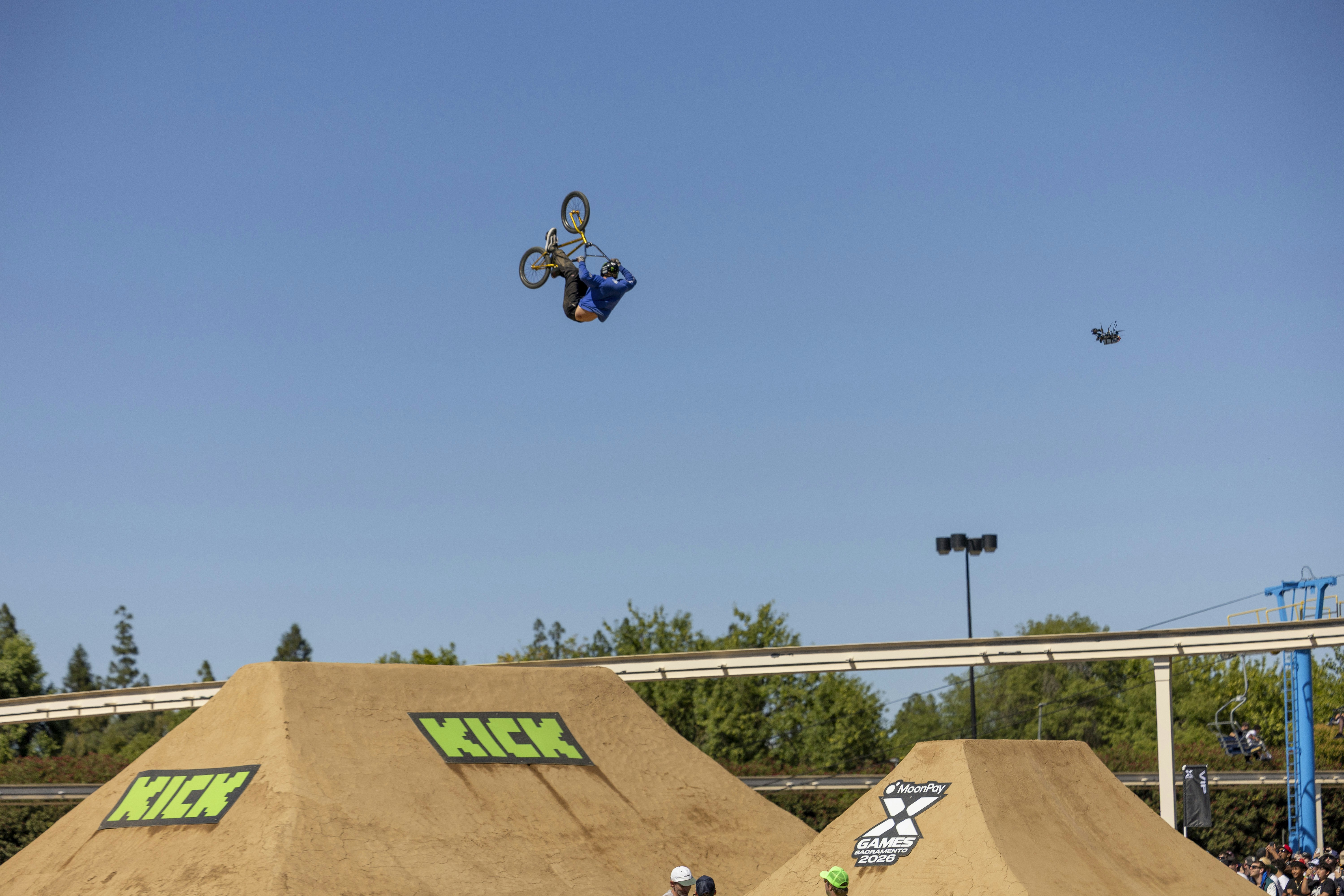 Mid-Air Flip over the Ramp: A BMX Rider Defies Gravity