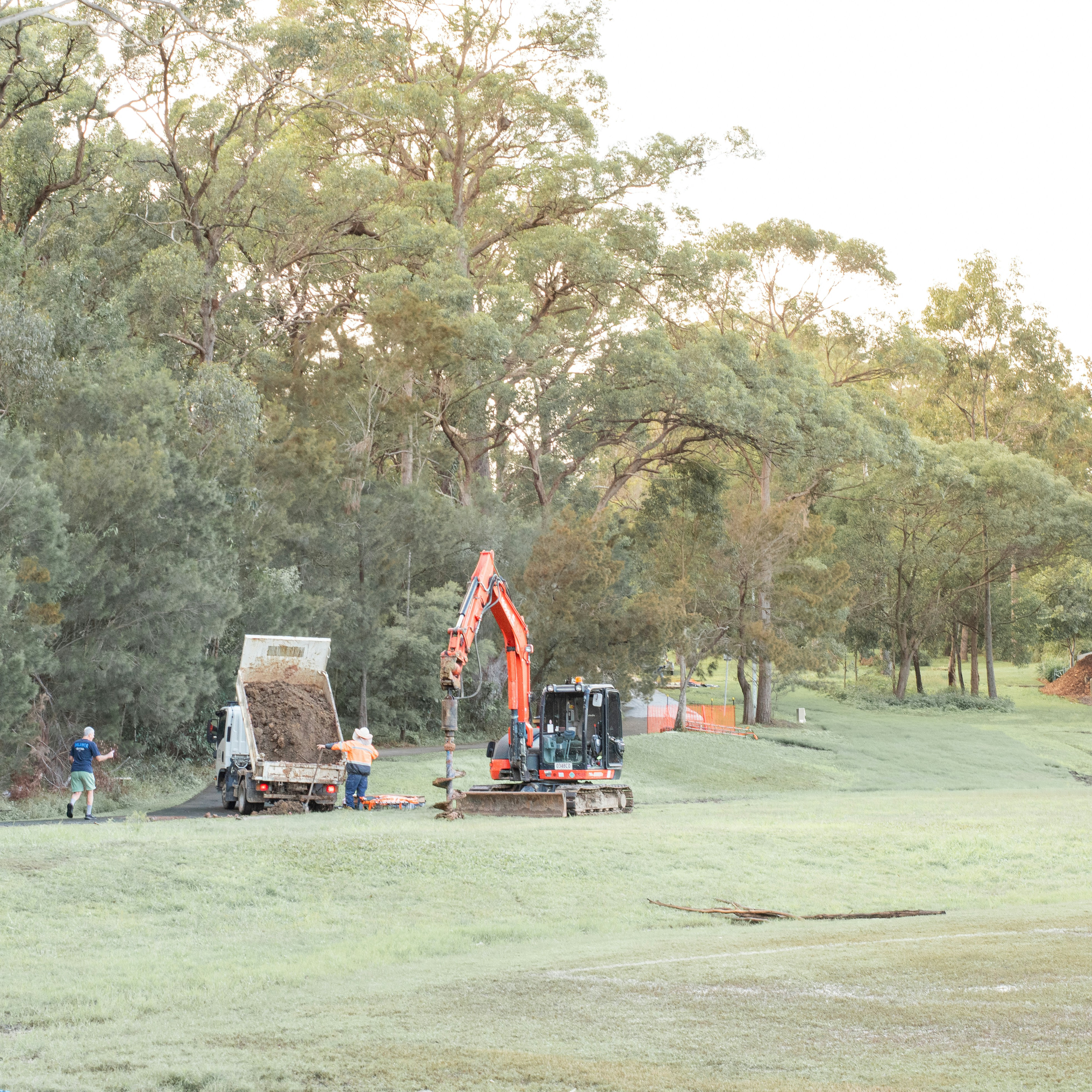 Earth Movers at Dusk: A Quiet Construction Scene in the Parklands