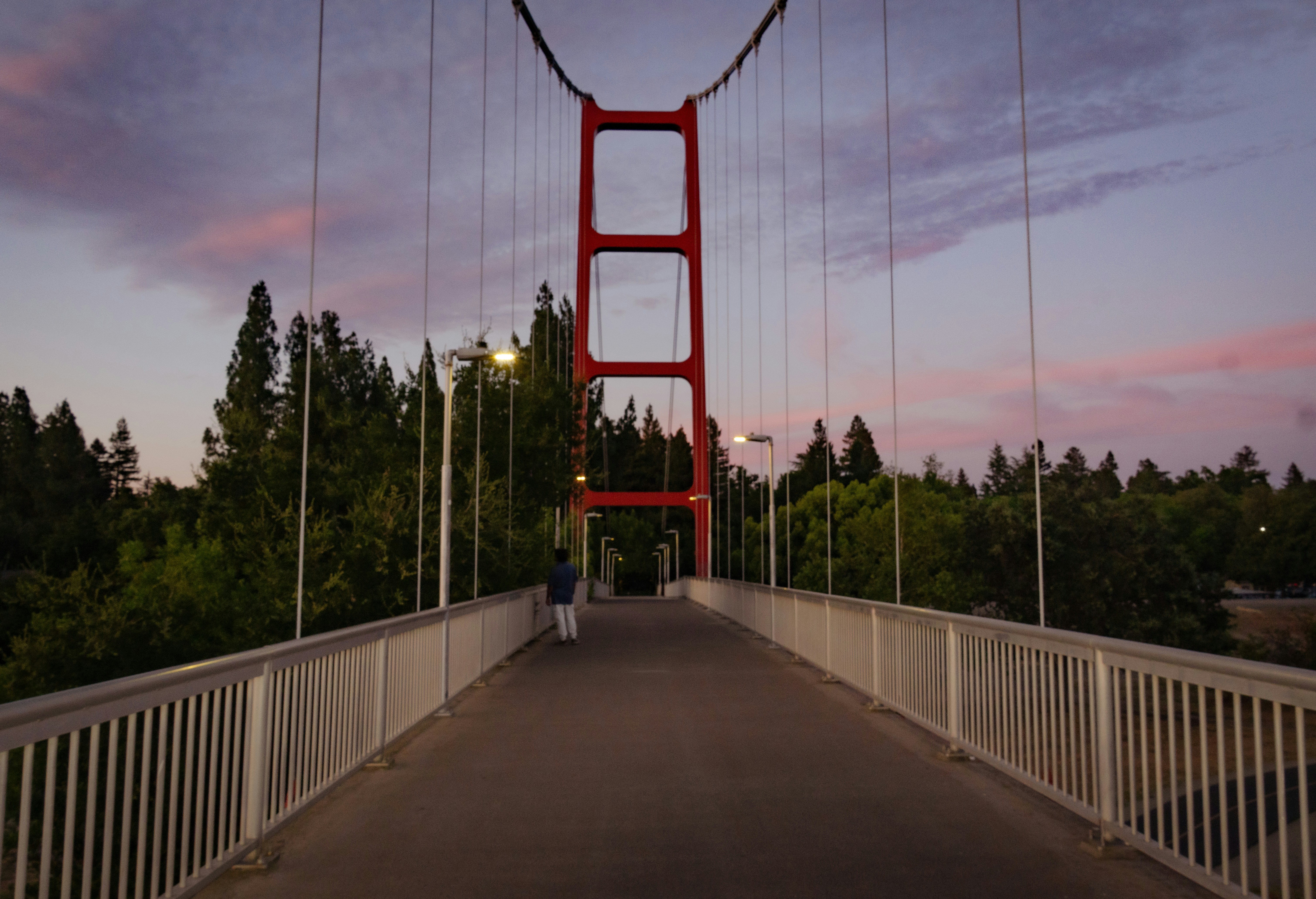 Red Suspension Bridge Aglow at Dusk