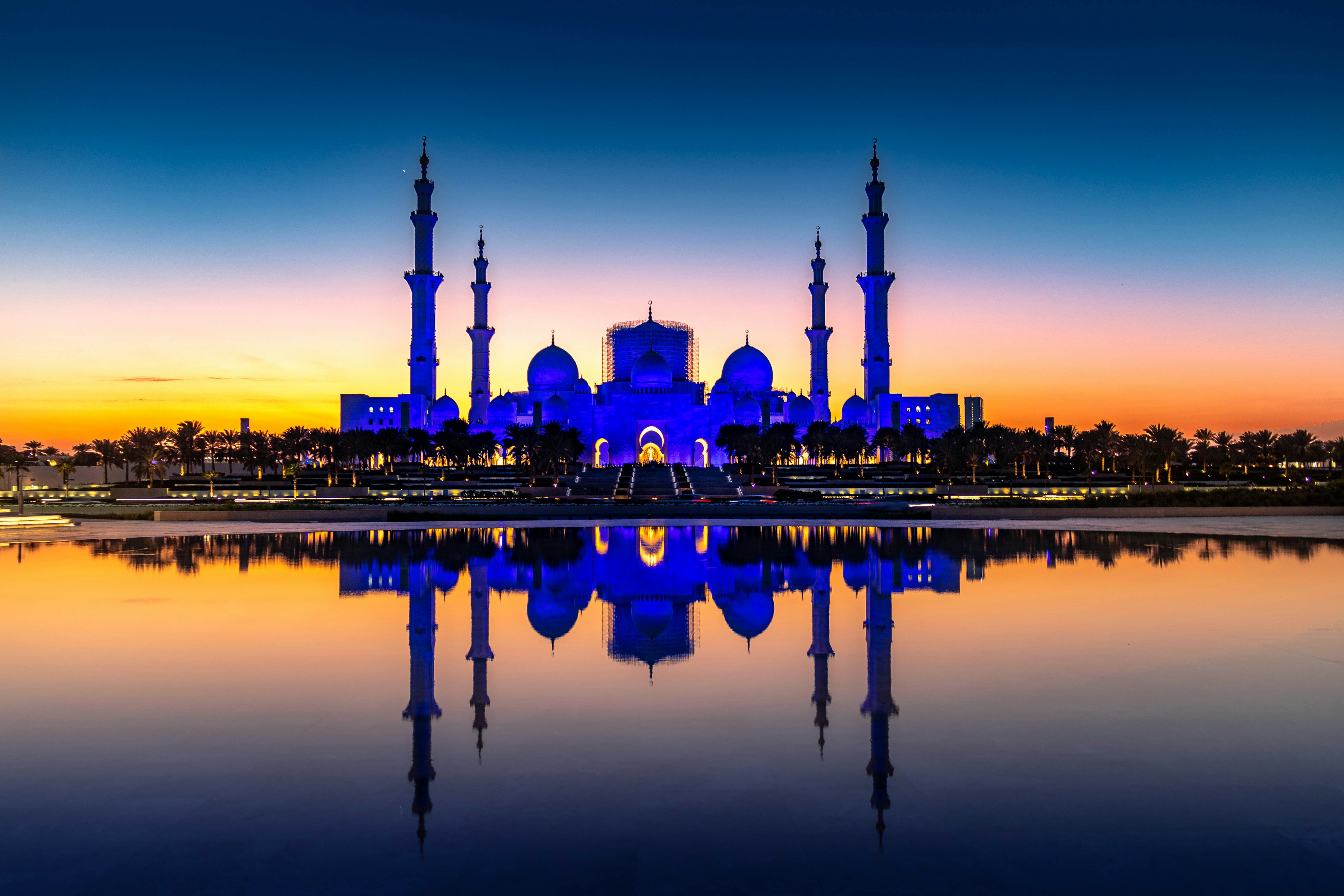 Twin-Spired Mosque Silhouette at Sunset, Rendered in Indigo and Gold
