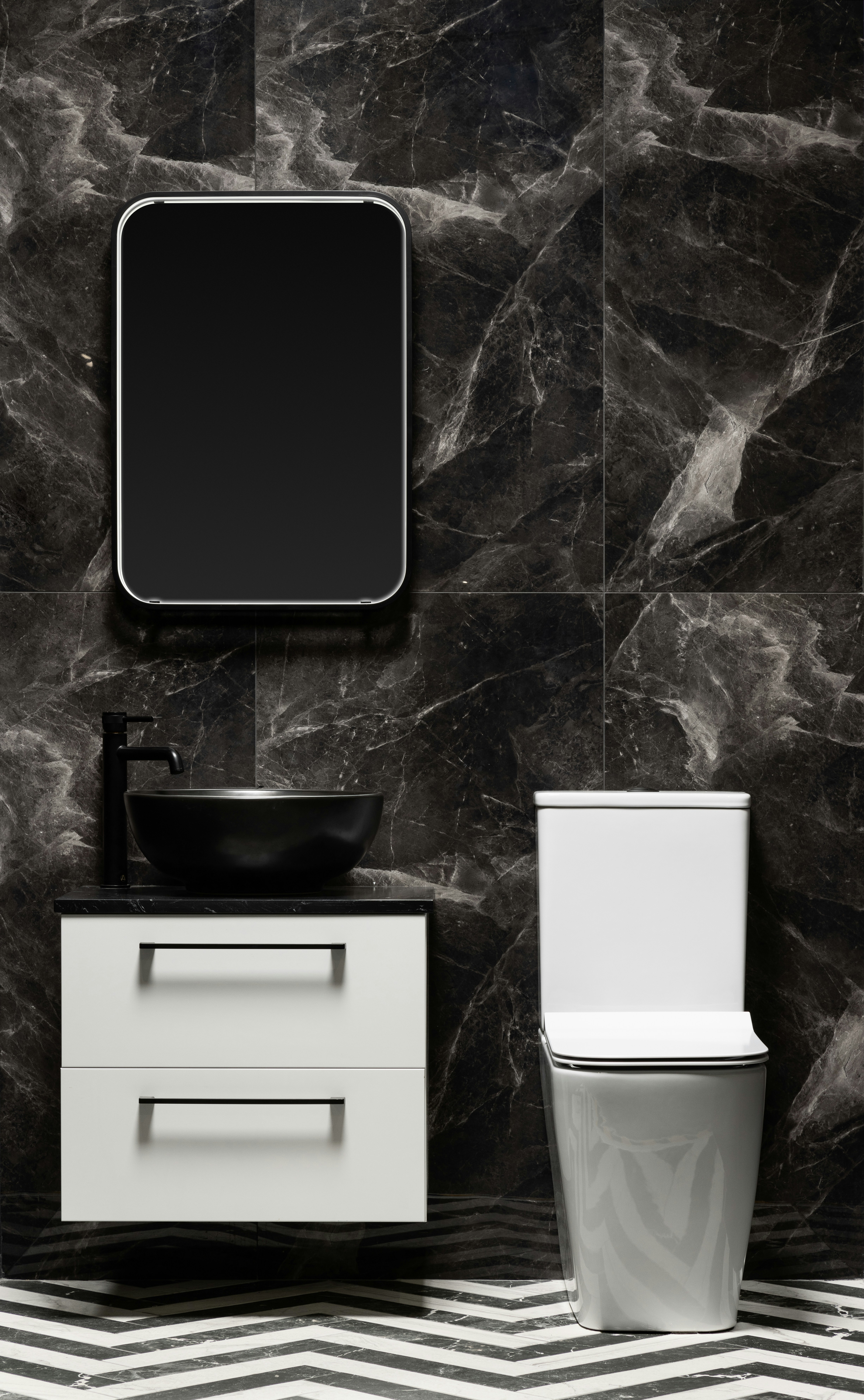 Monochrome Bath: A Minimalist Bathroom Scene with Sleek Vanity and Toilet