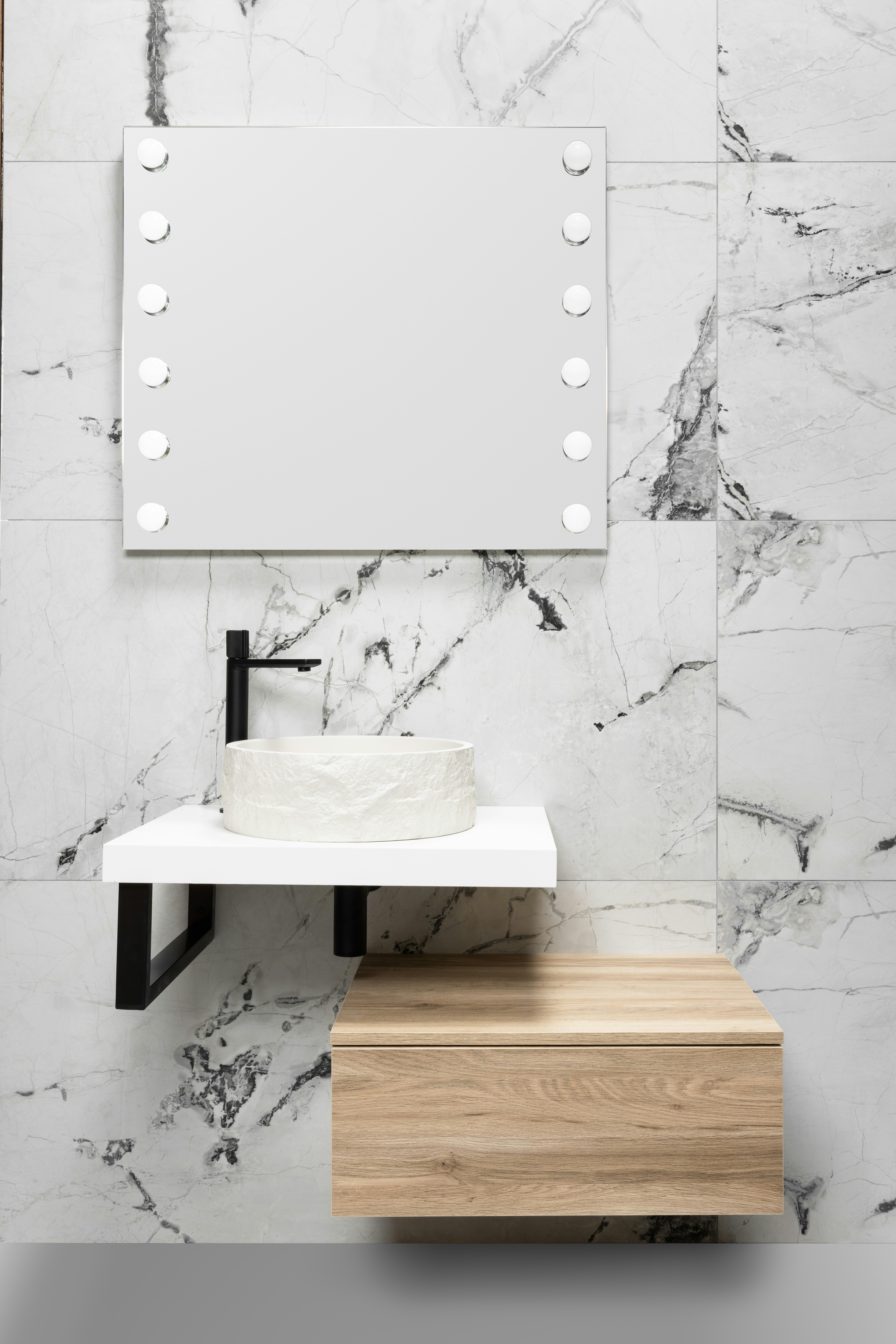 Minimal Marble Oasis: A Wall-Mounted Sink Beneath a Backlit Vanity Mirror