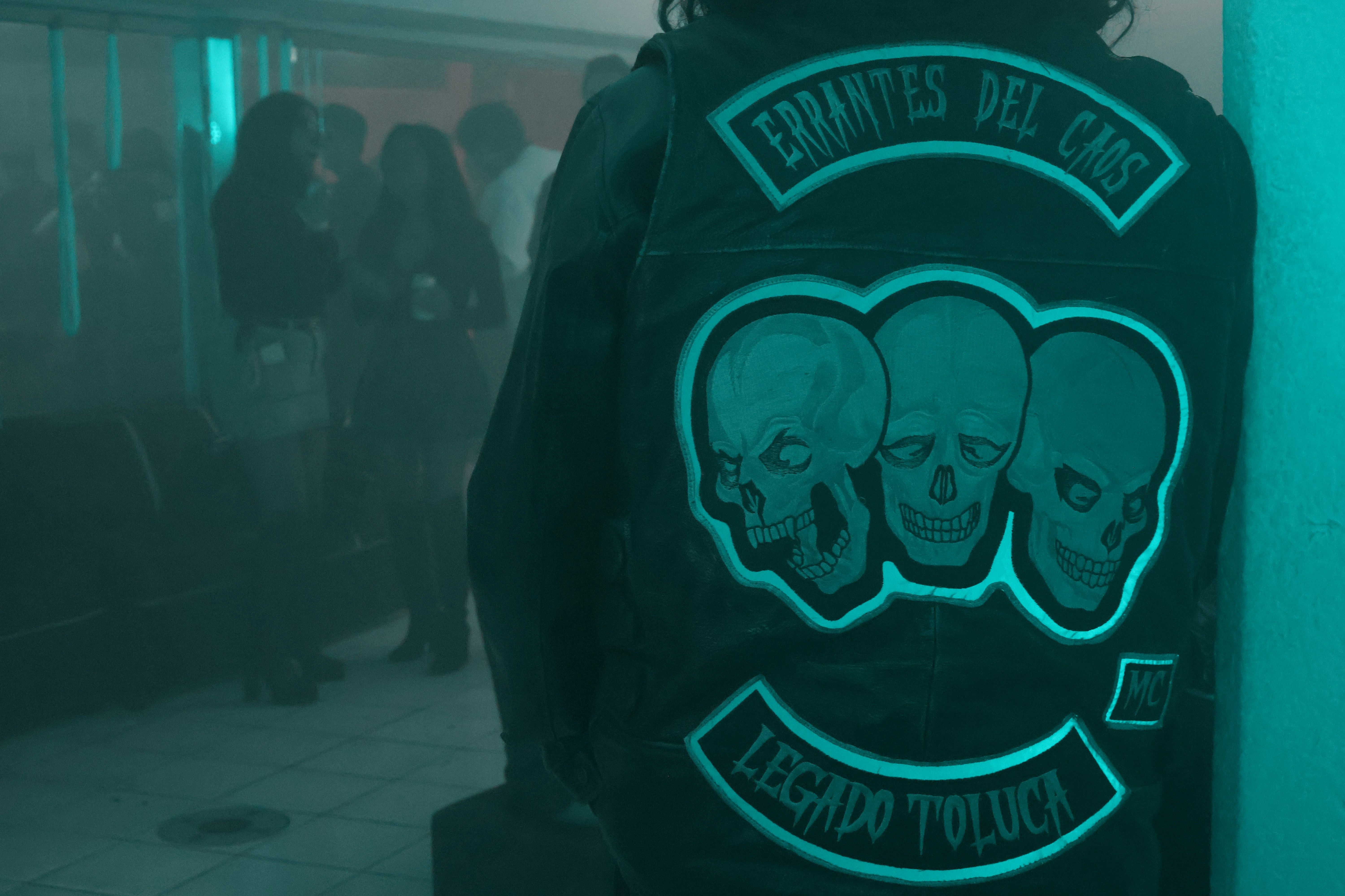 Patchwork afterglow: skulls and club night in teal