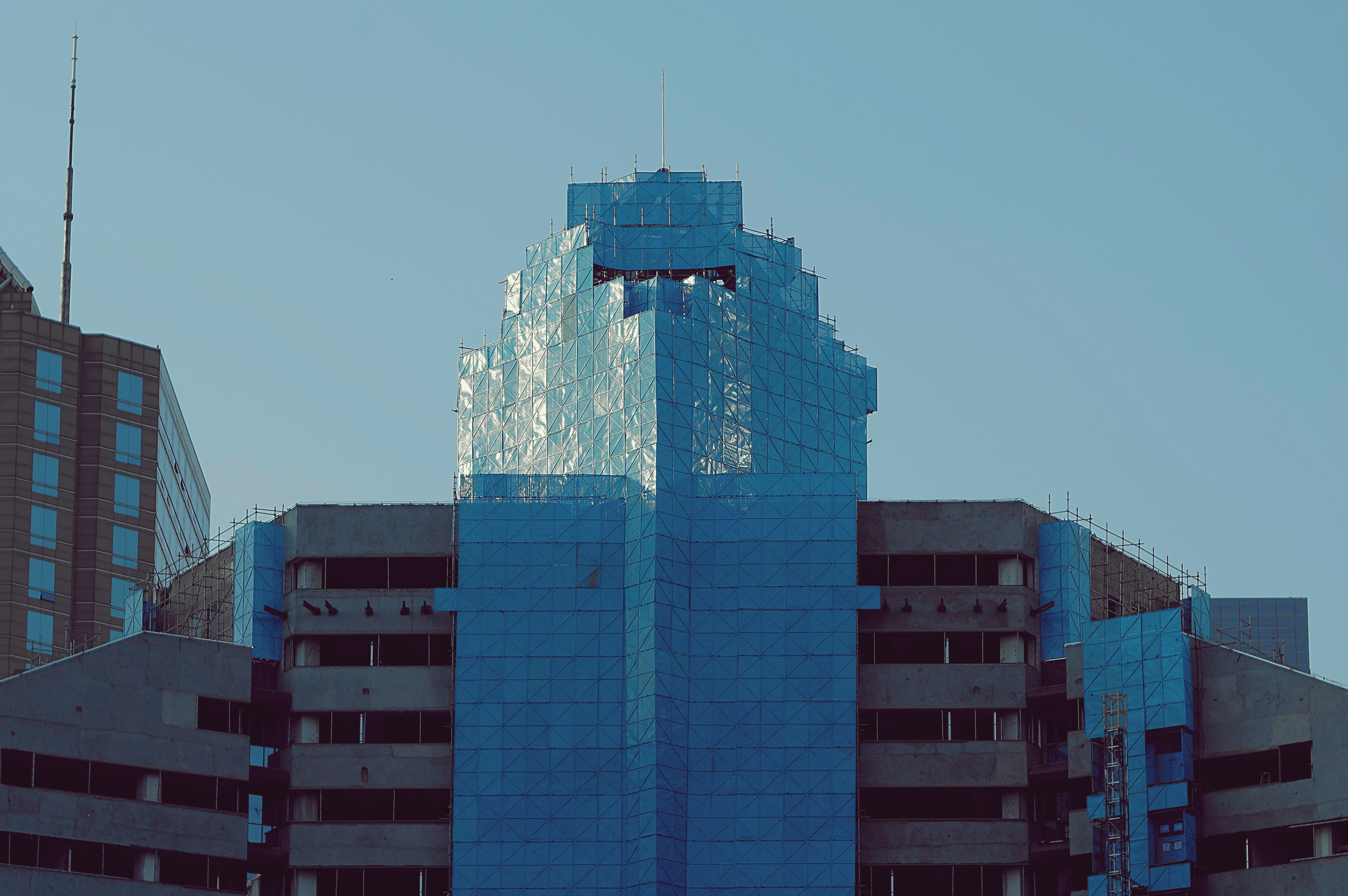 Skyward City: The Stepwise Facade Reaches Toward the Clear Sky