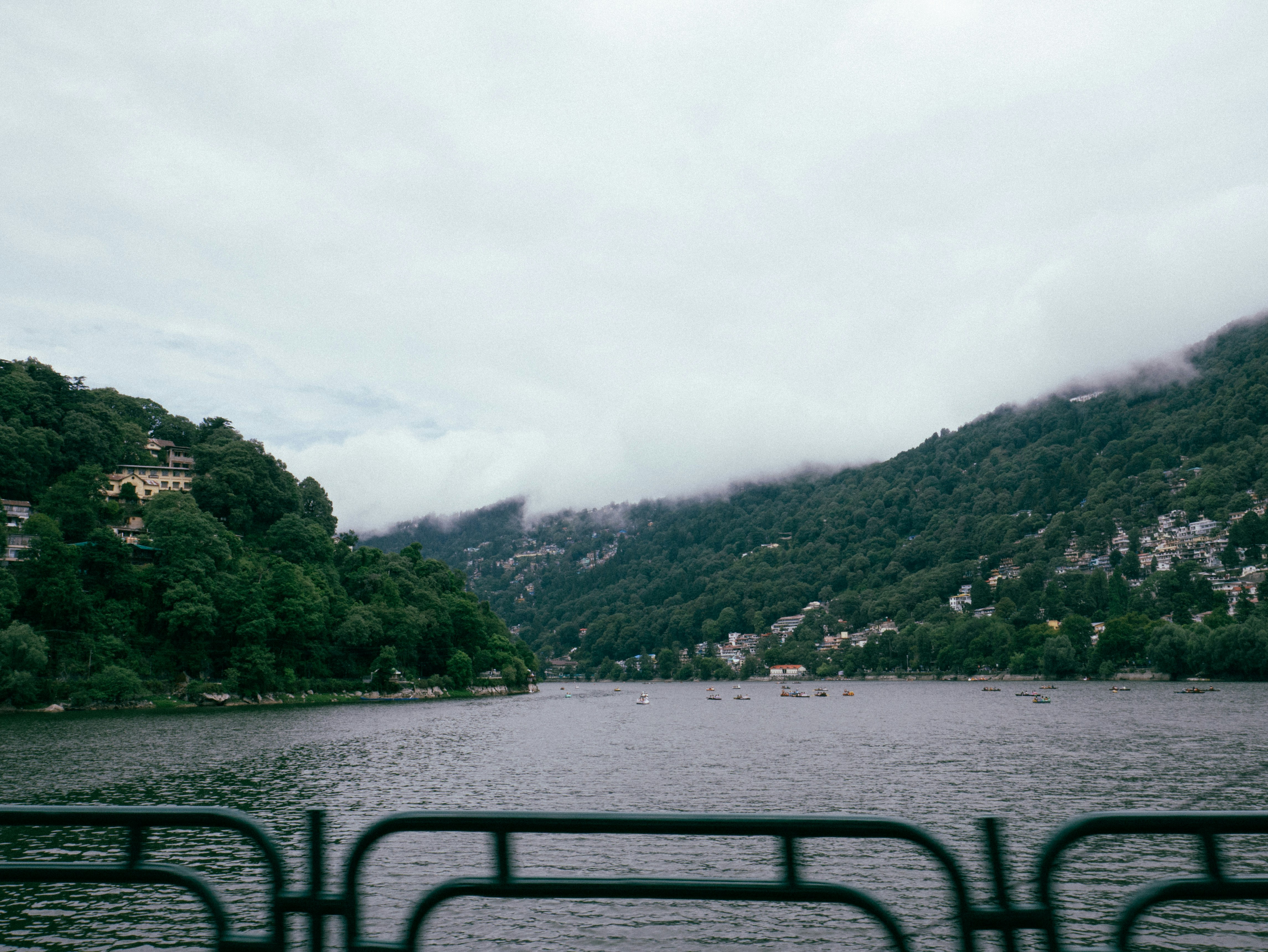 Misty Lake Between Verdant Hills