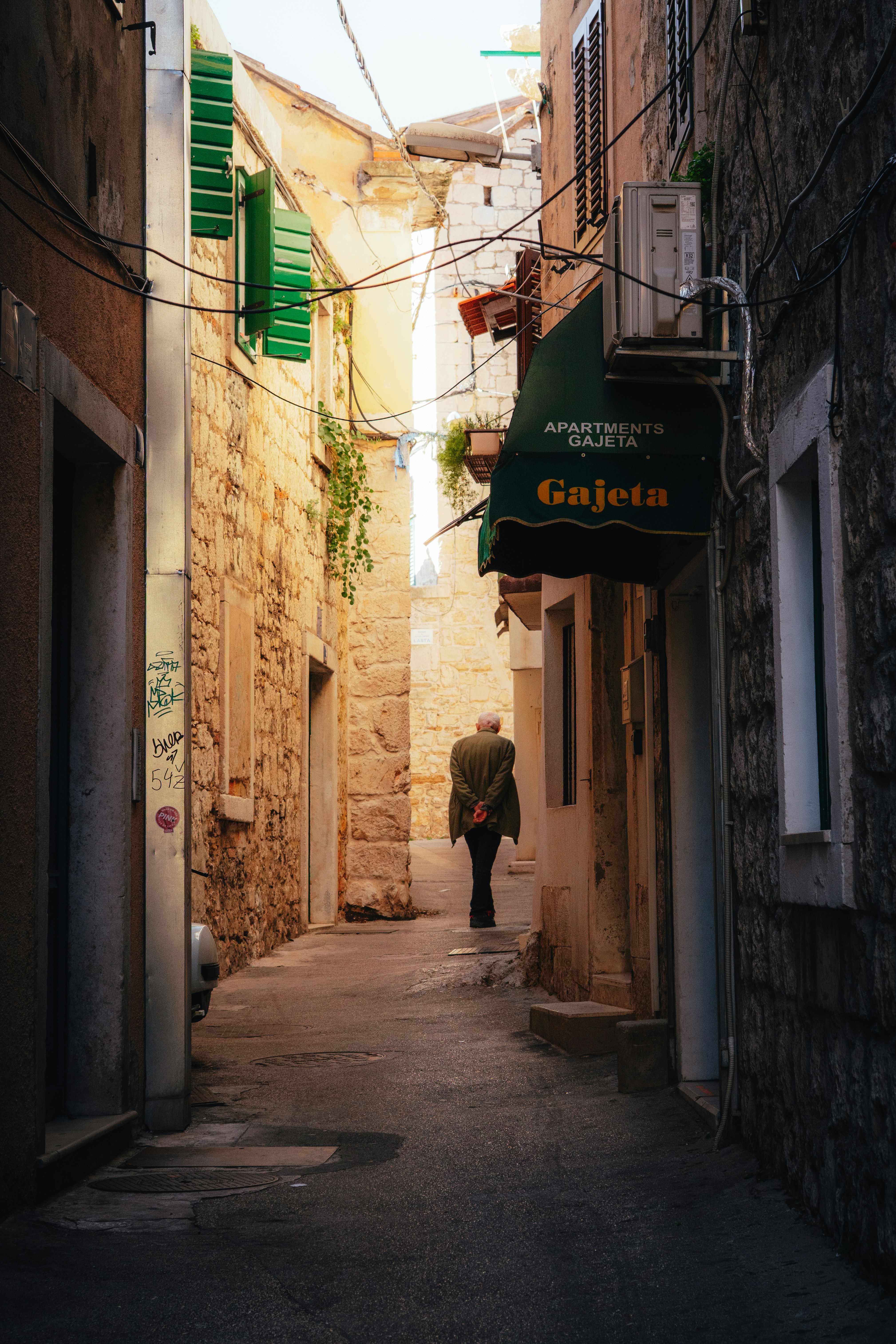 Sunlit Alley Reverie: A Quiet Walk Toward the Distant Light