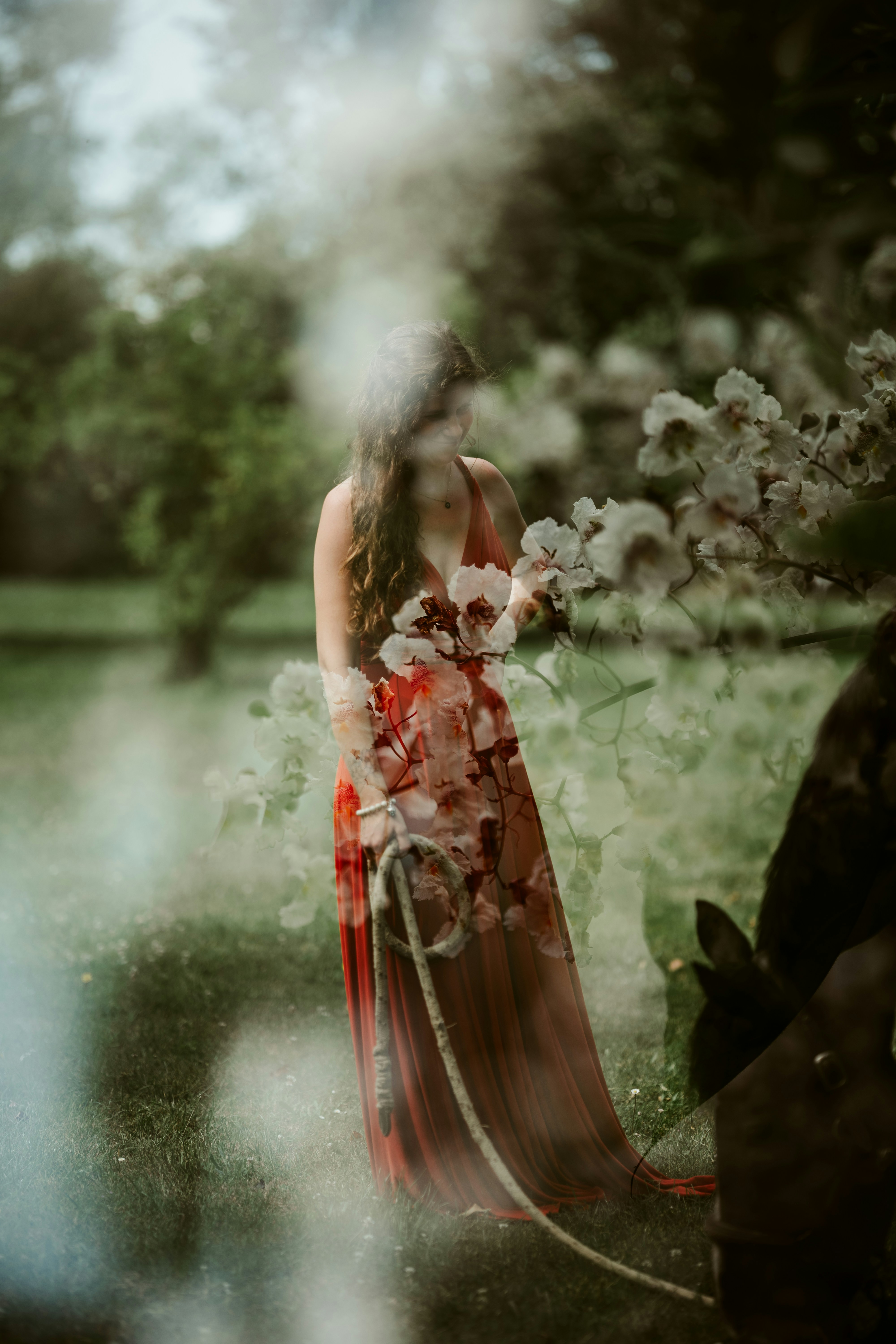 Red Dress in a Dream: A Soft-Focused Portrait in a Garden