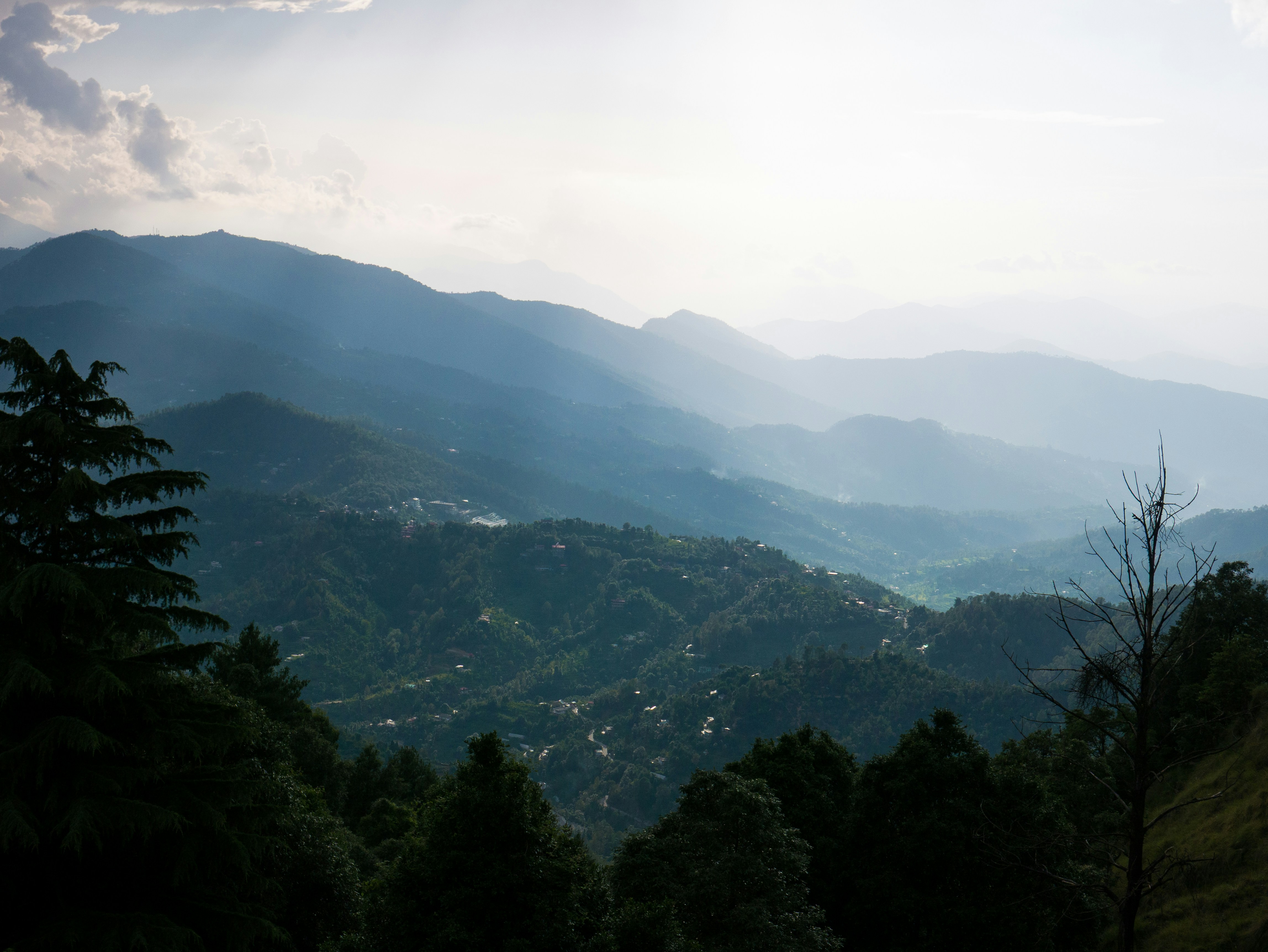 Mist-Laced Range: Valley Layers Behind a Quiet Ridge
